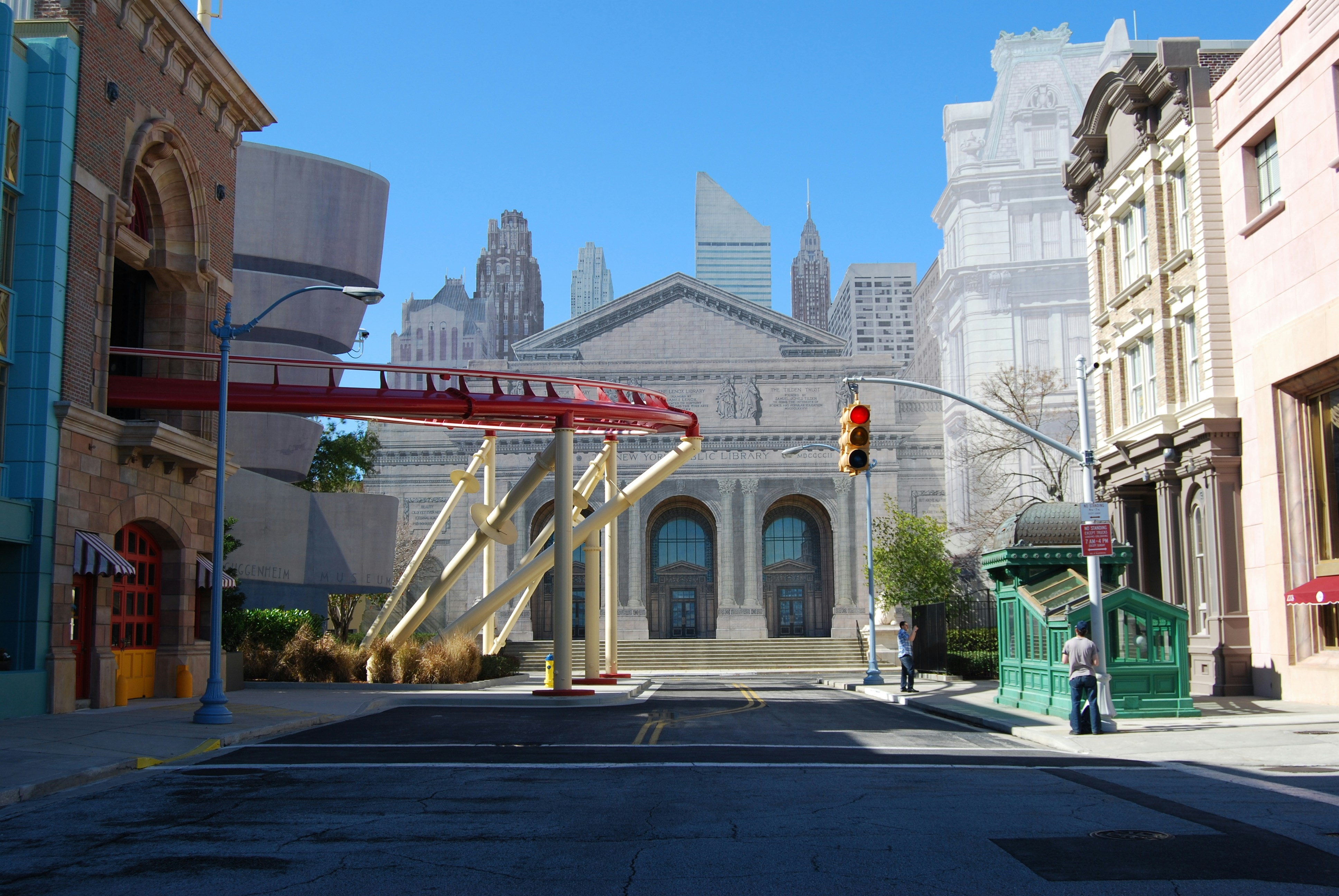 Old City Street Meets Modern Skyline: The Grand Facade Across the Street