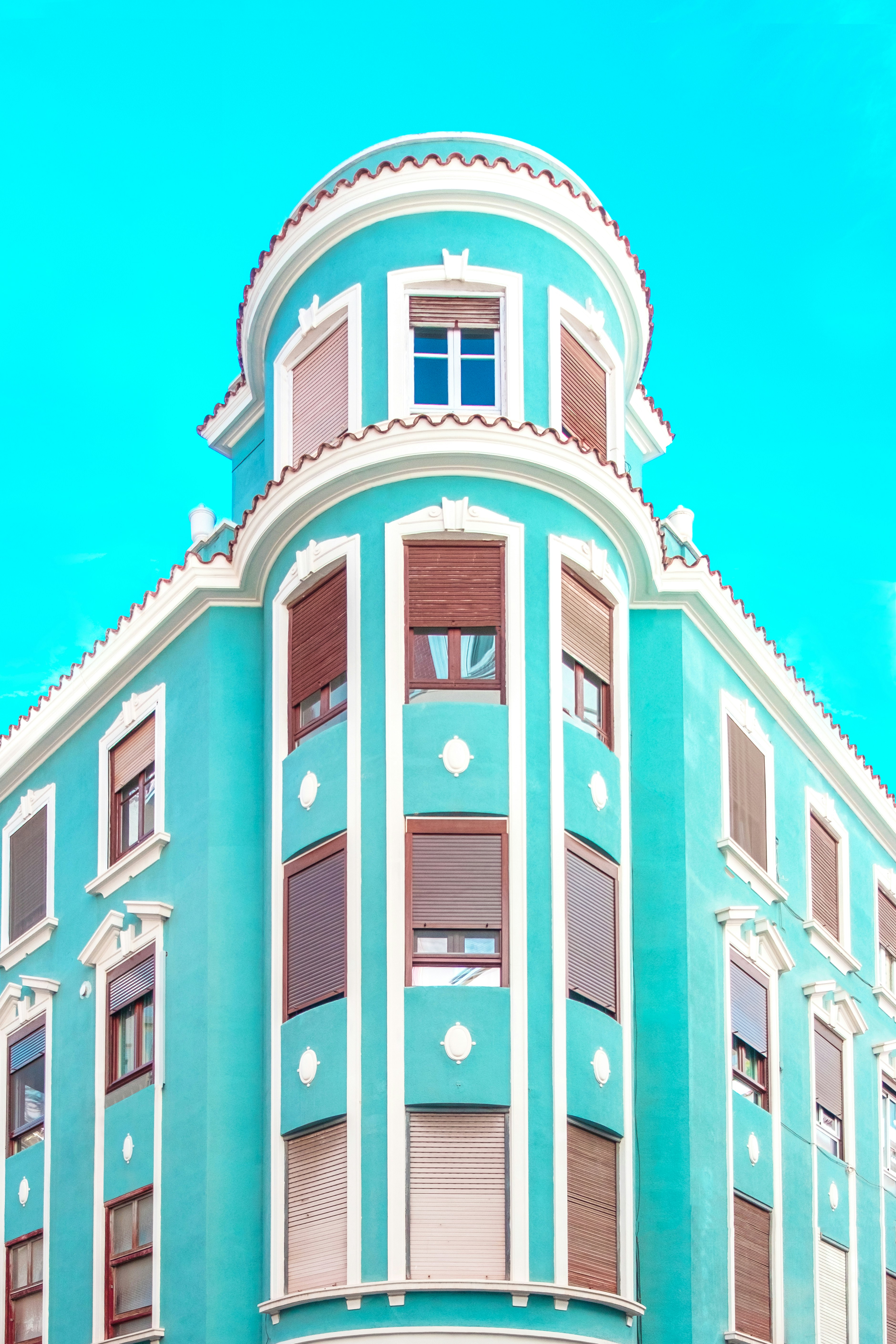 Red and white concrete building photo – Free Alicante Image on Unsplash