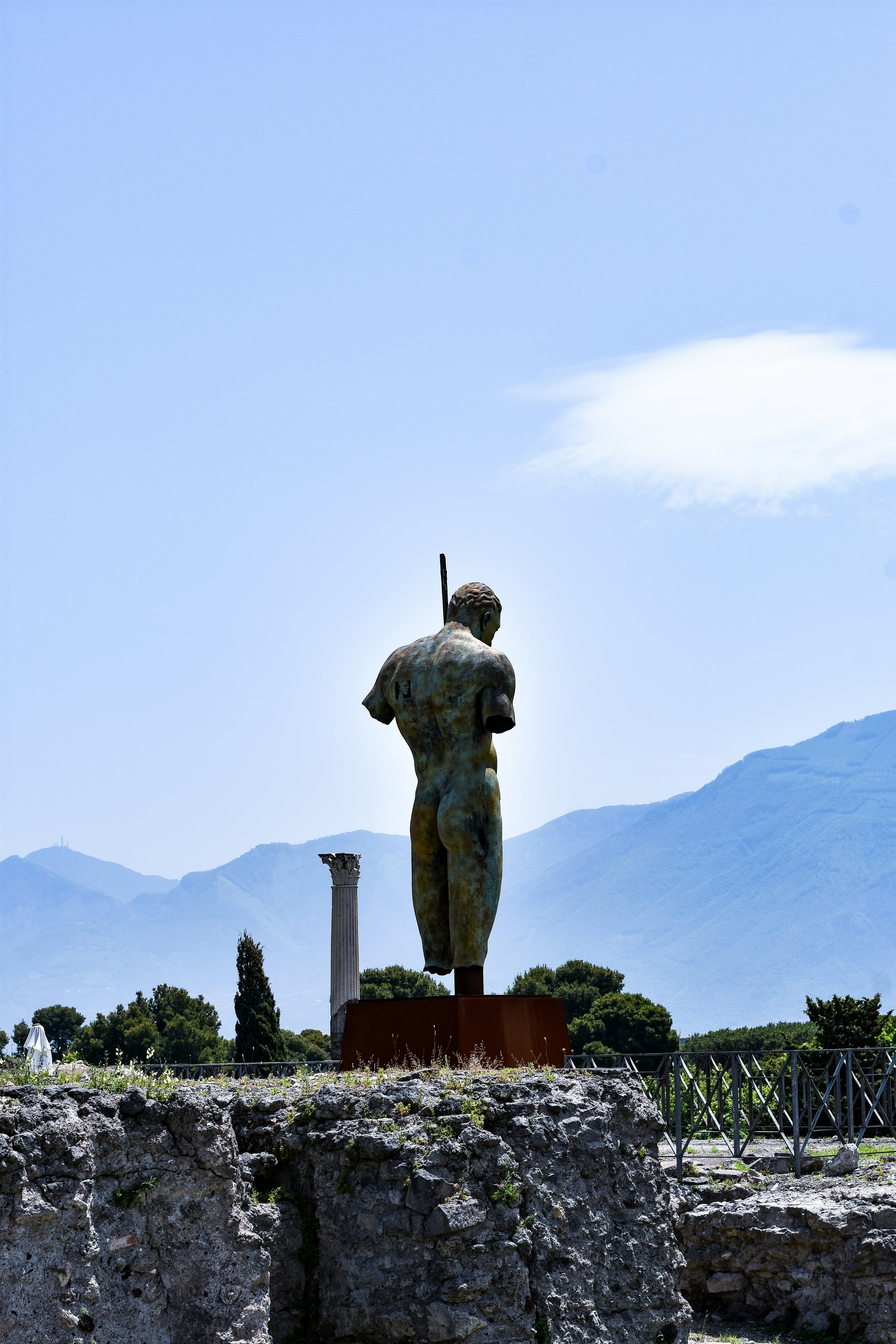 Bronze Sentinel Over Alpine Ruins