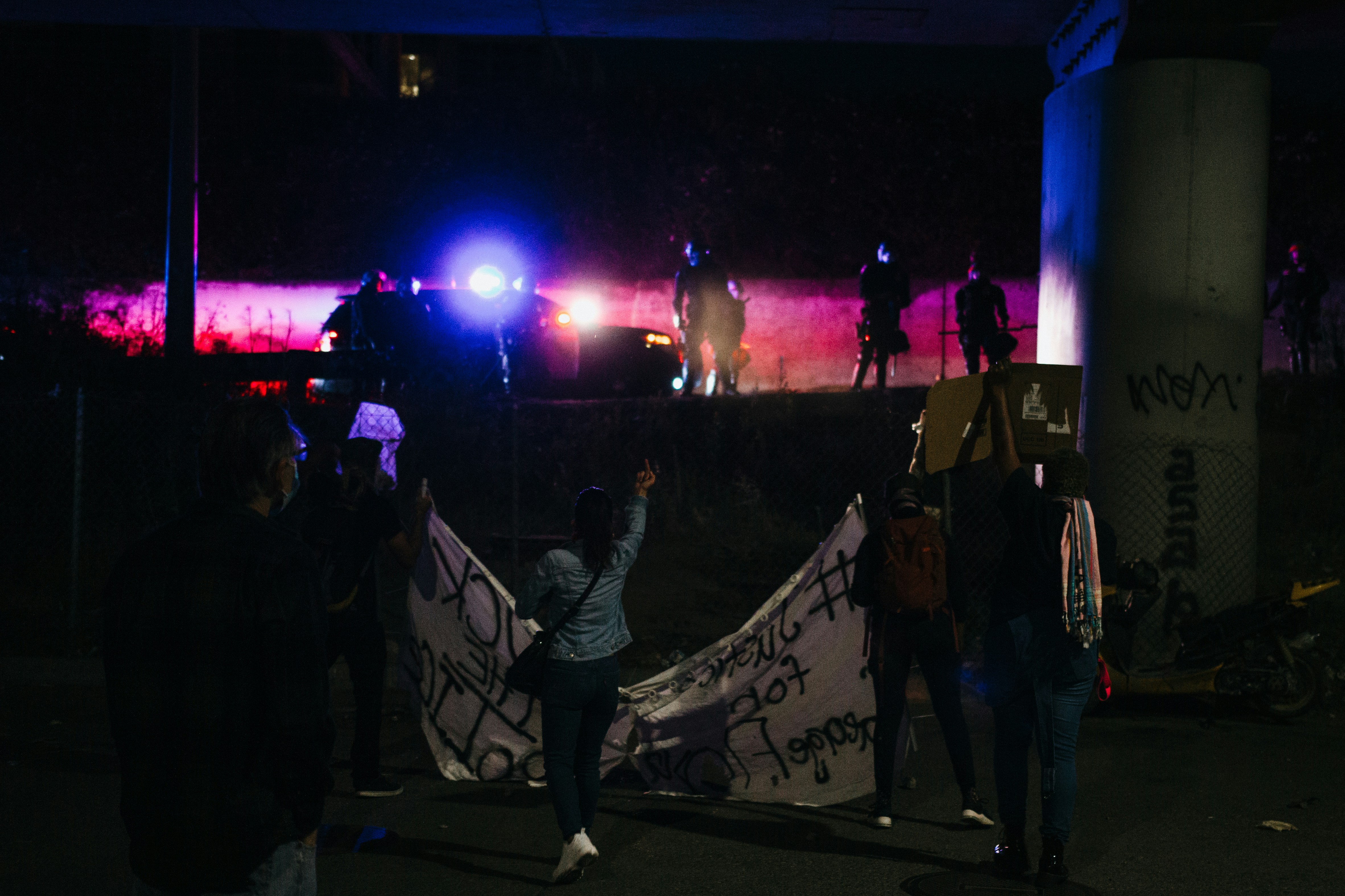People standing on stage with lights turned on during night time photo ...