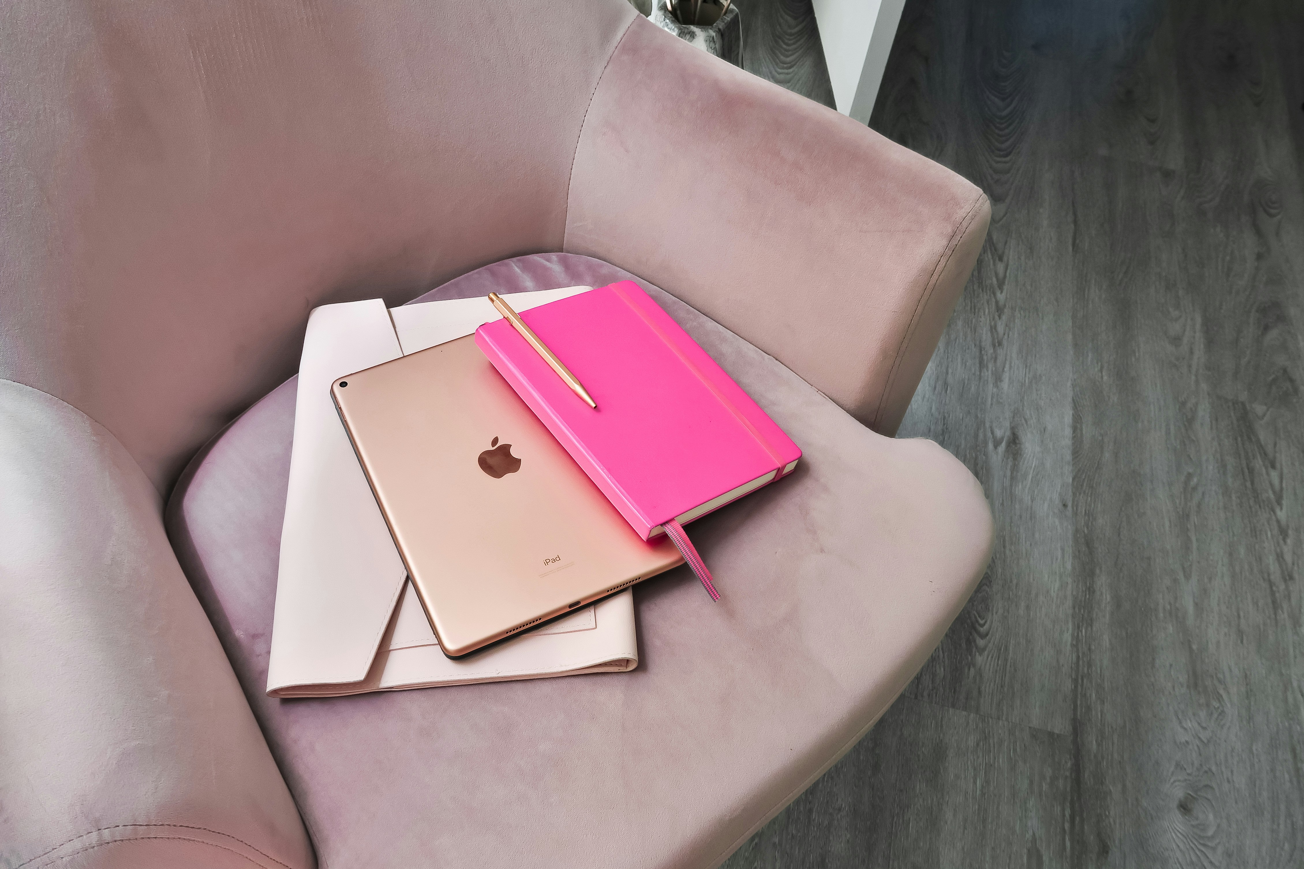 Pink tablet computer case on pink chair photo – Free Pink Image on Unsplash