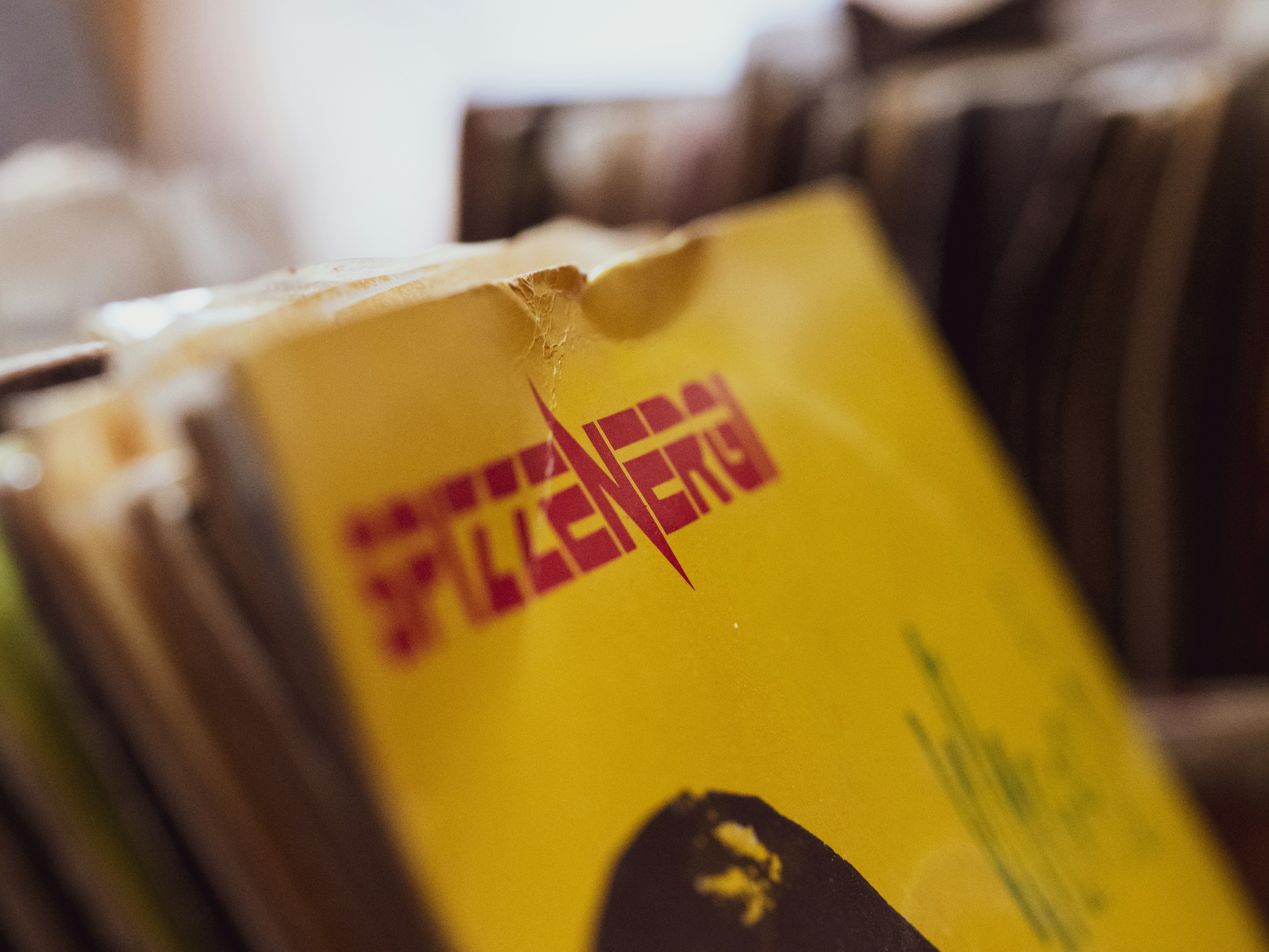 Hushed Yellow: A Box of Retro Records on a Shelf