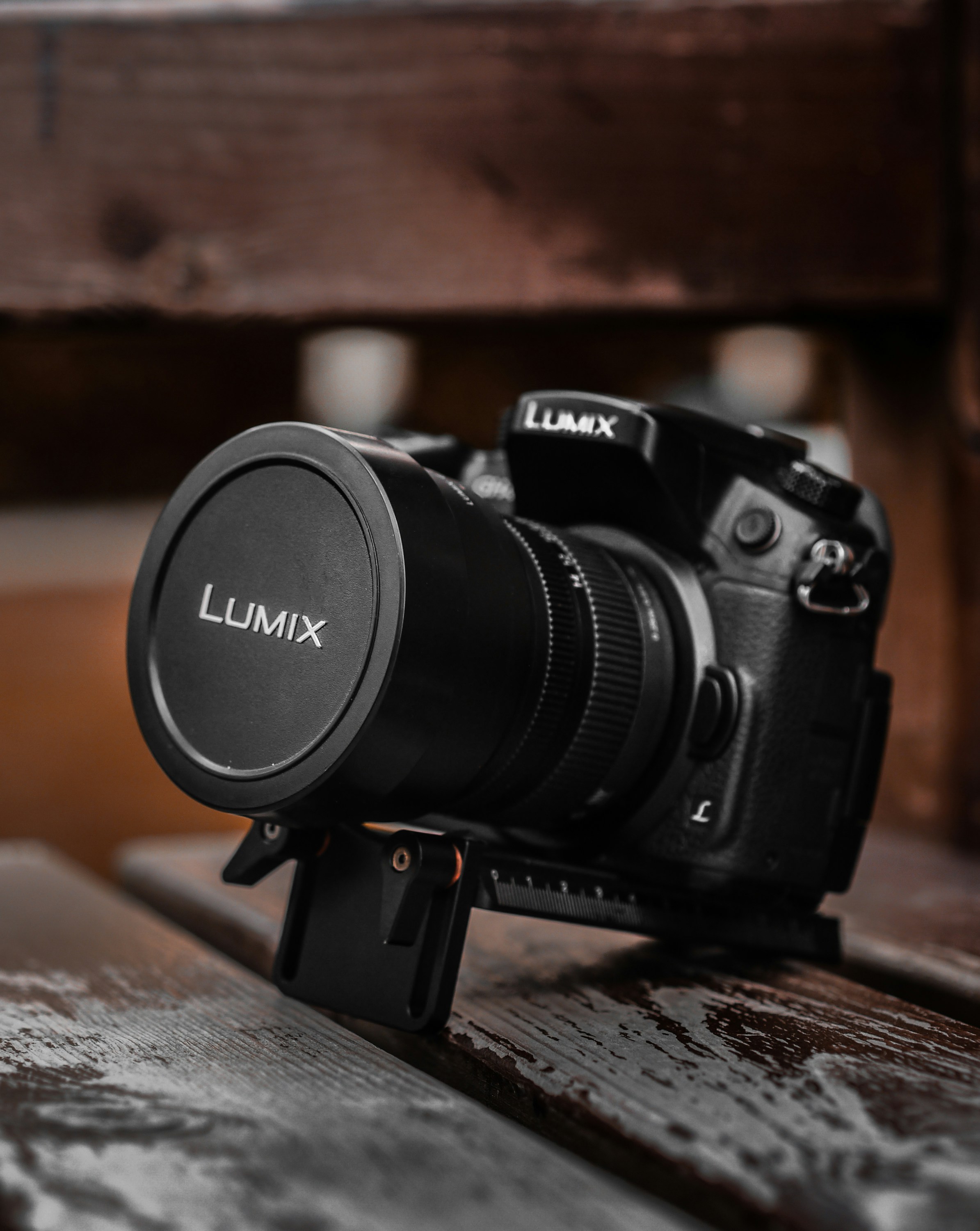 Black nikon dslr camera on brown wooden table photo – Free Turquie ...