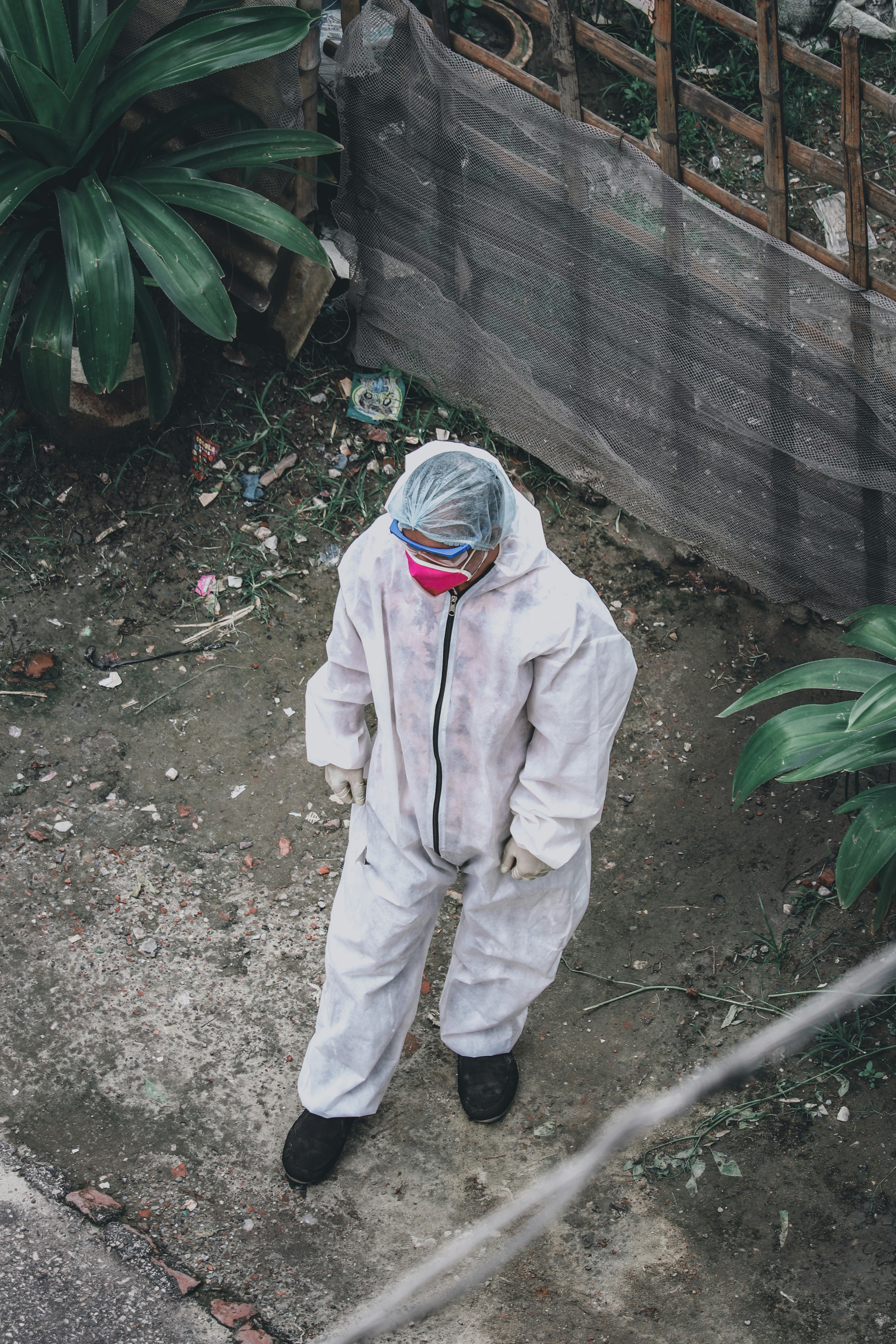 Aligned in PPE: A lone worker surveys the yard from above