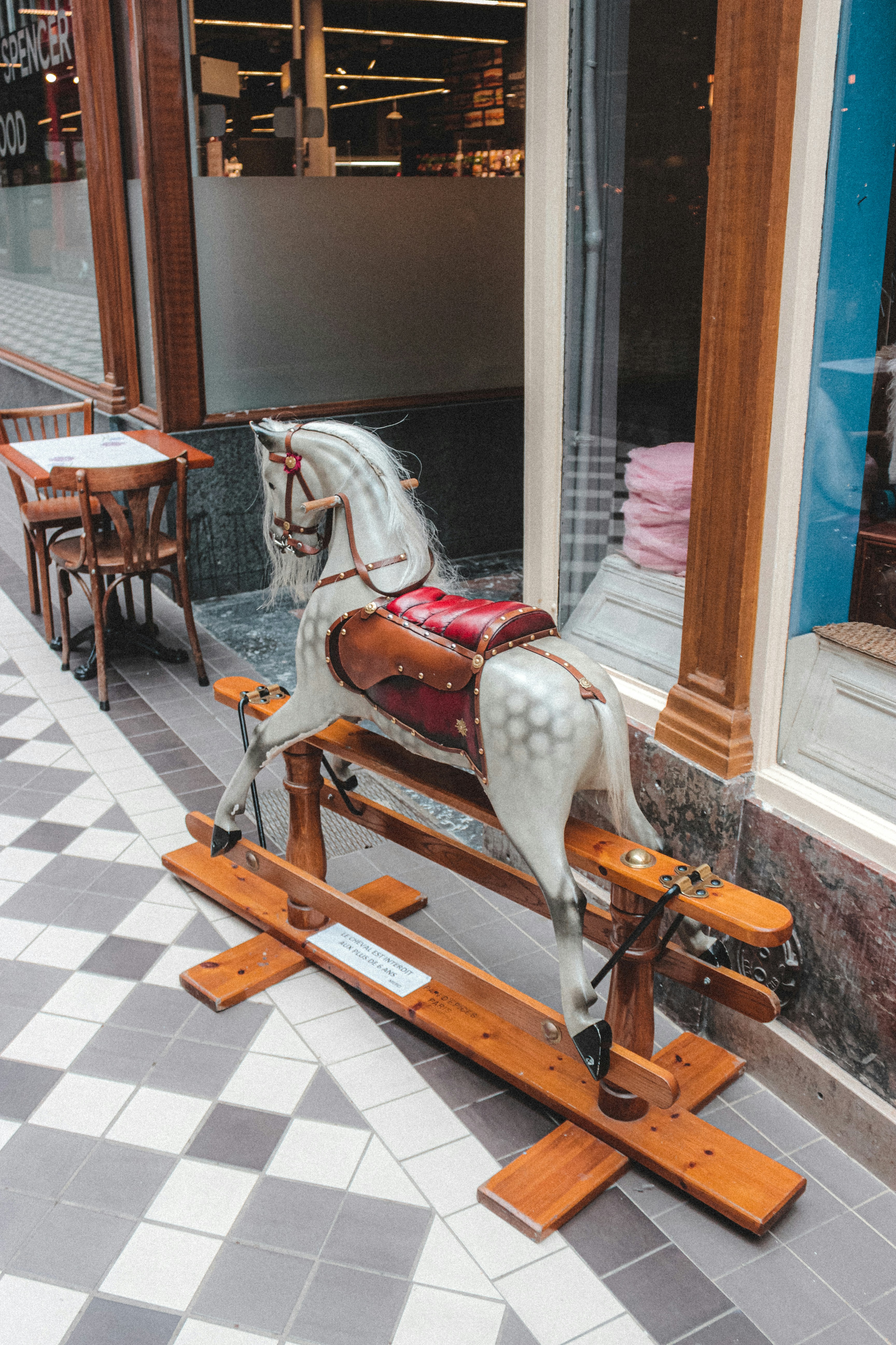 Carousel of Craft and Chrome: A Street Carousel in Stone-and-Glass Light