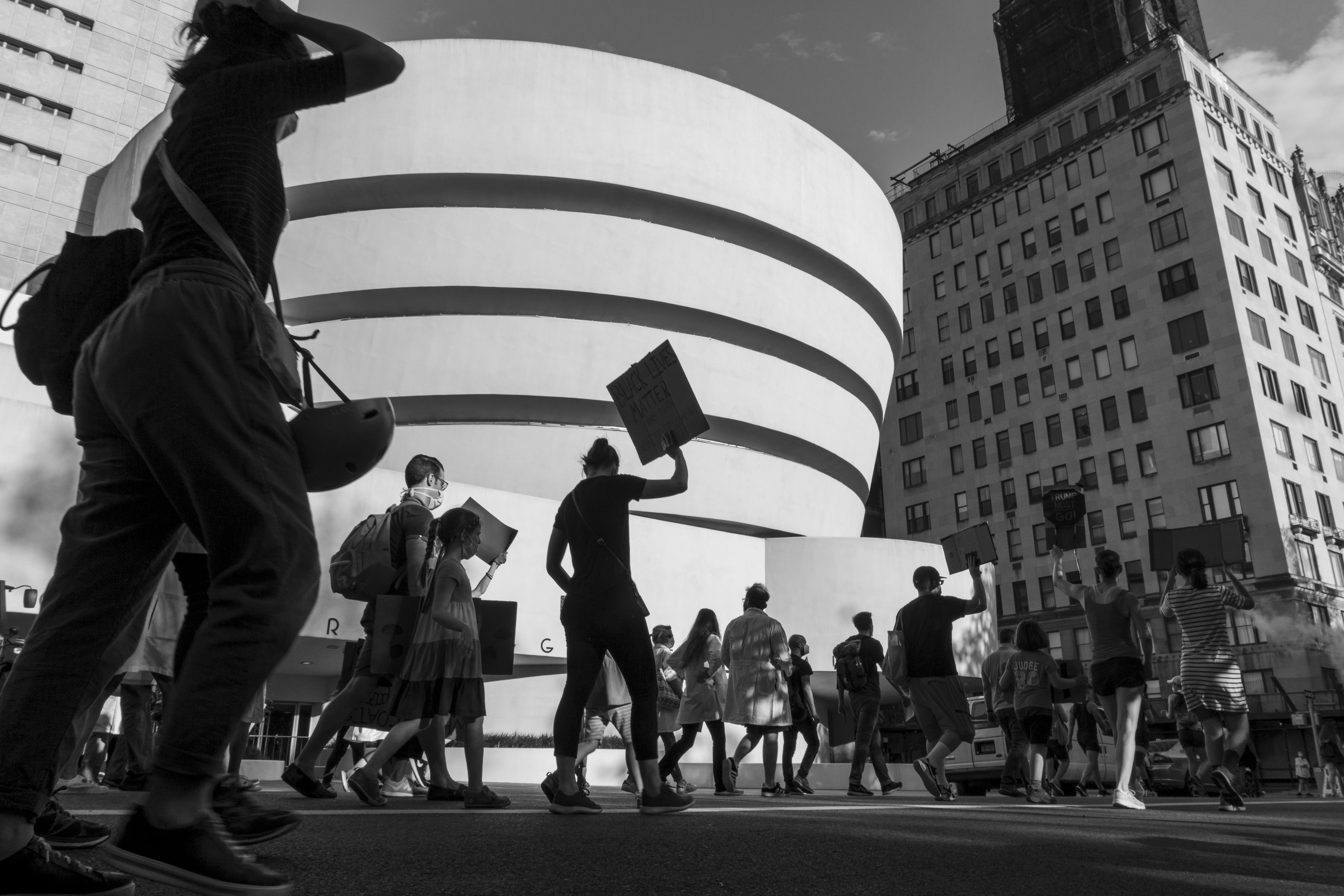 Pulse Beneath the Rotunda: A Black-and-White Street Parade