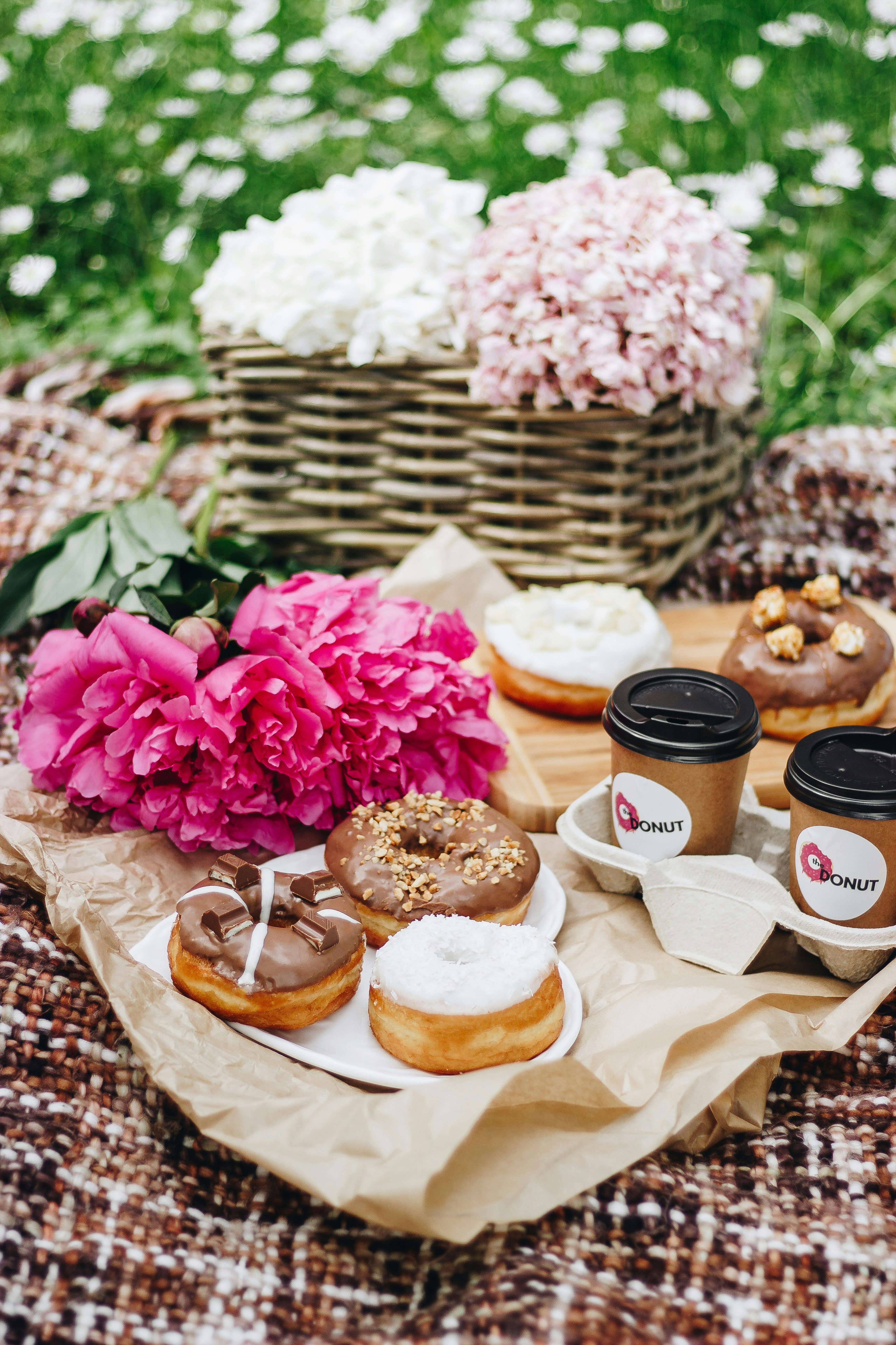 Donuts, Lattes, and Blooms: A Cozy Floral Picnic Spread