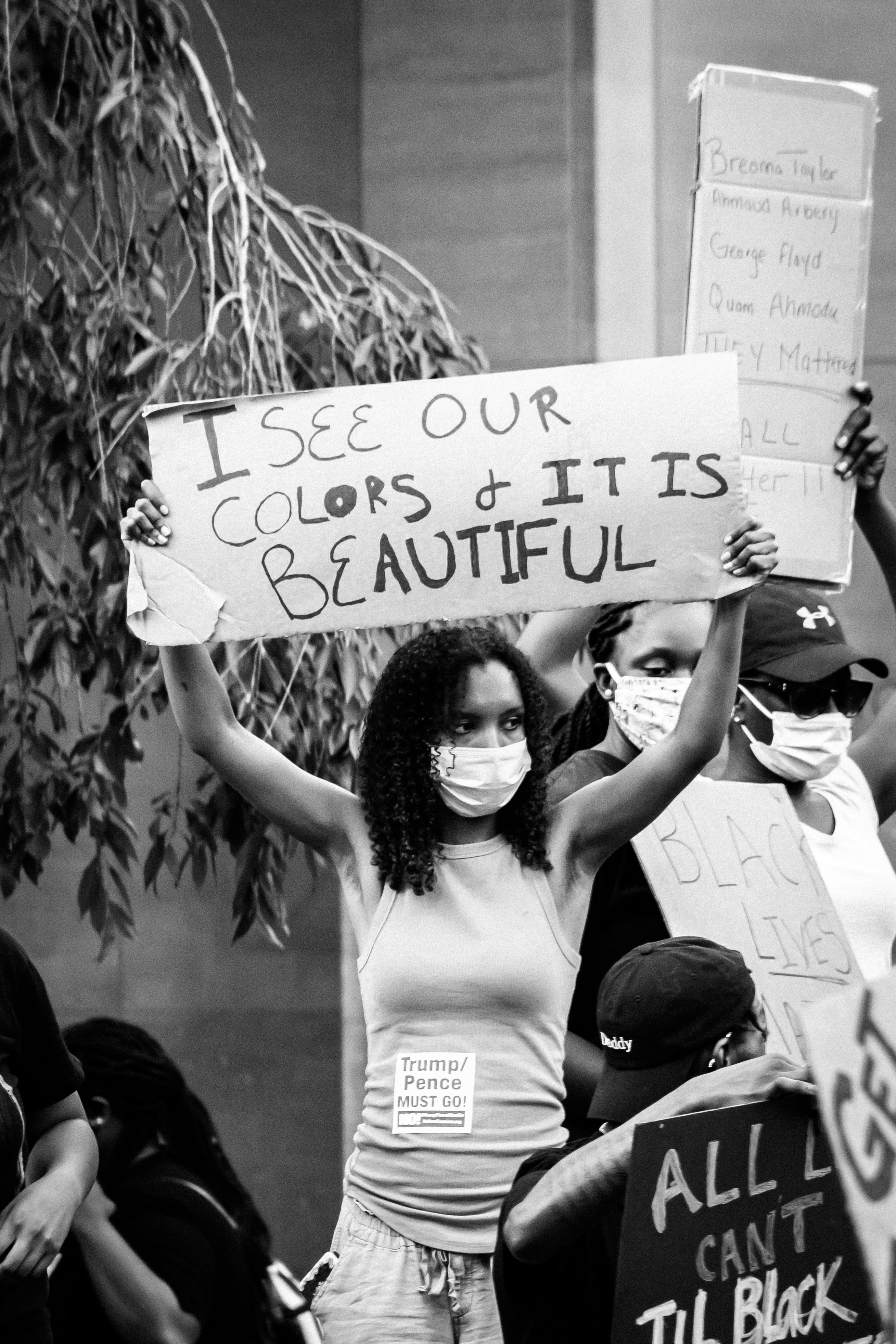 Raised Sign, Unified Voices: A Masked Protest for Black Lives Matter