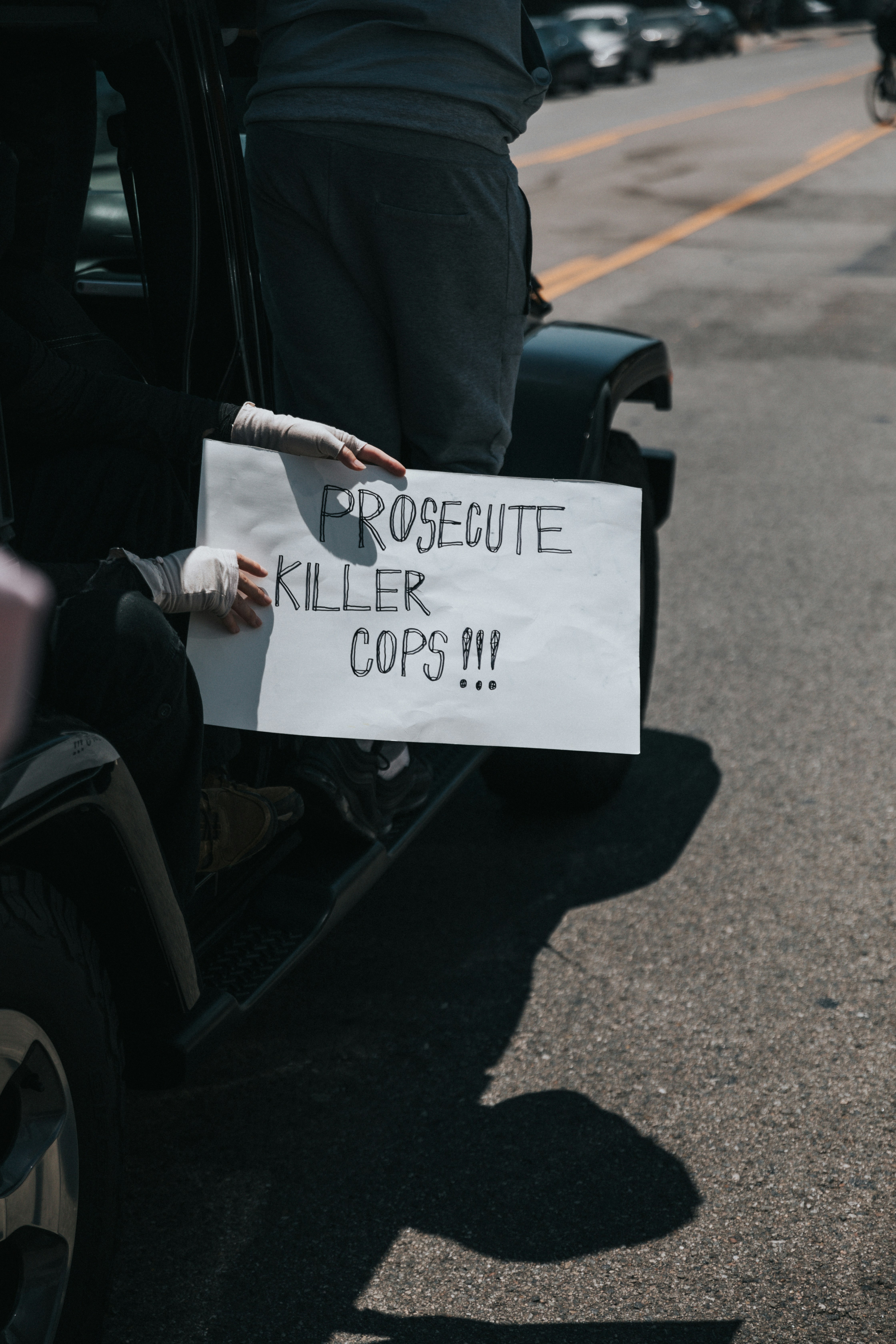 person holding white printer paper