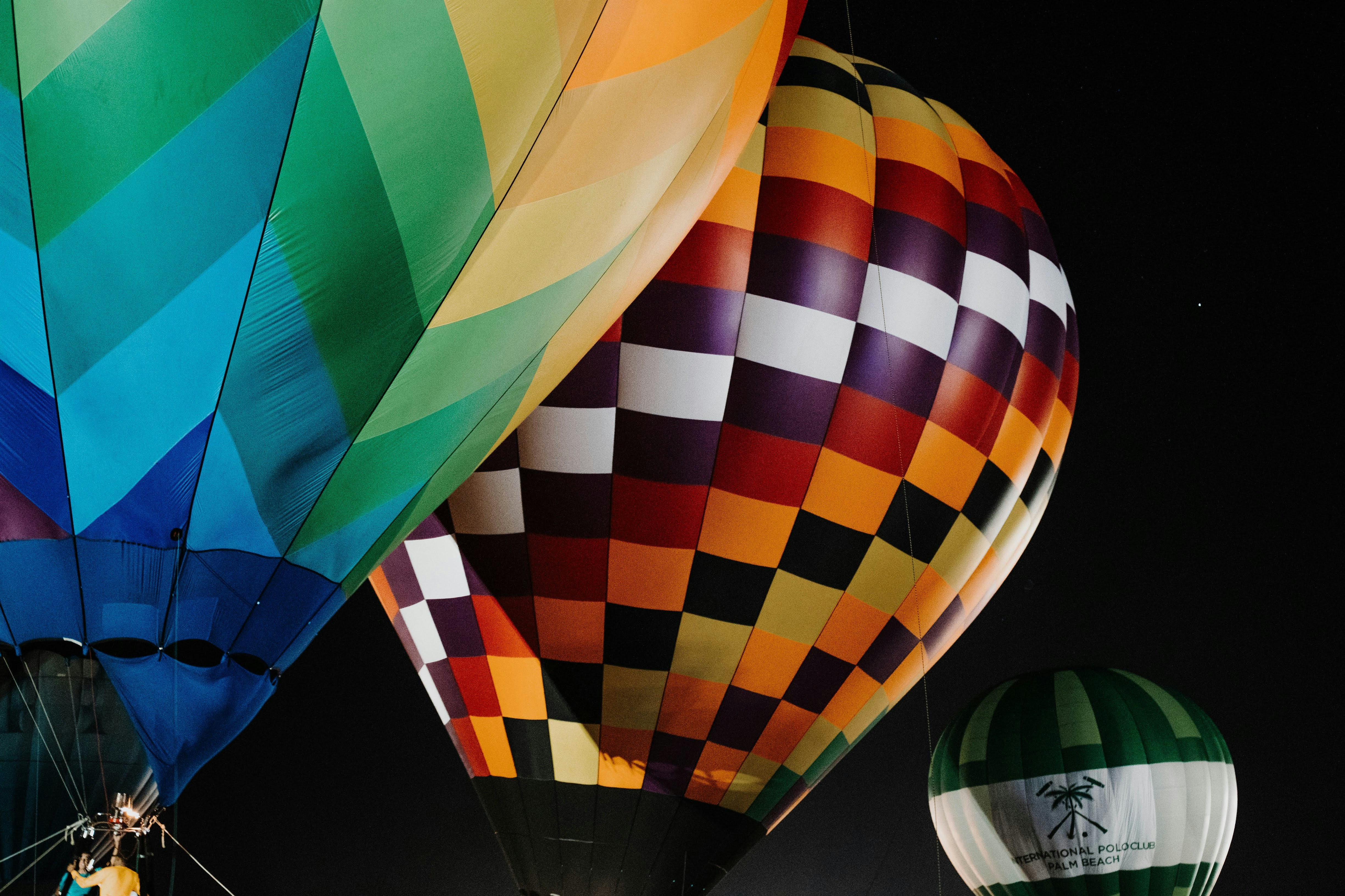 Chromatic Giants Under Nightfall: A Balloon Parade