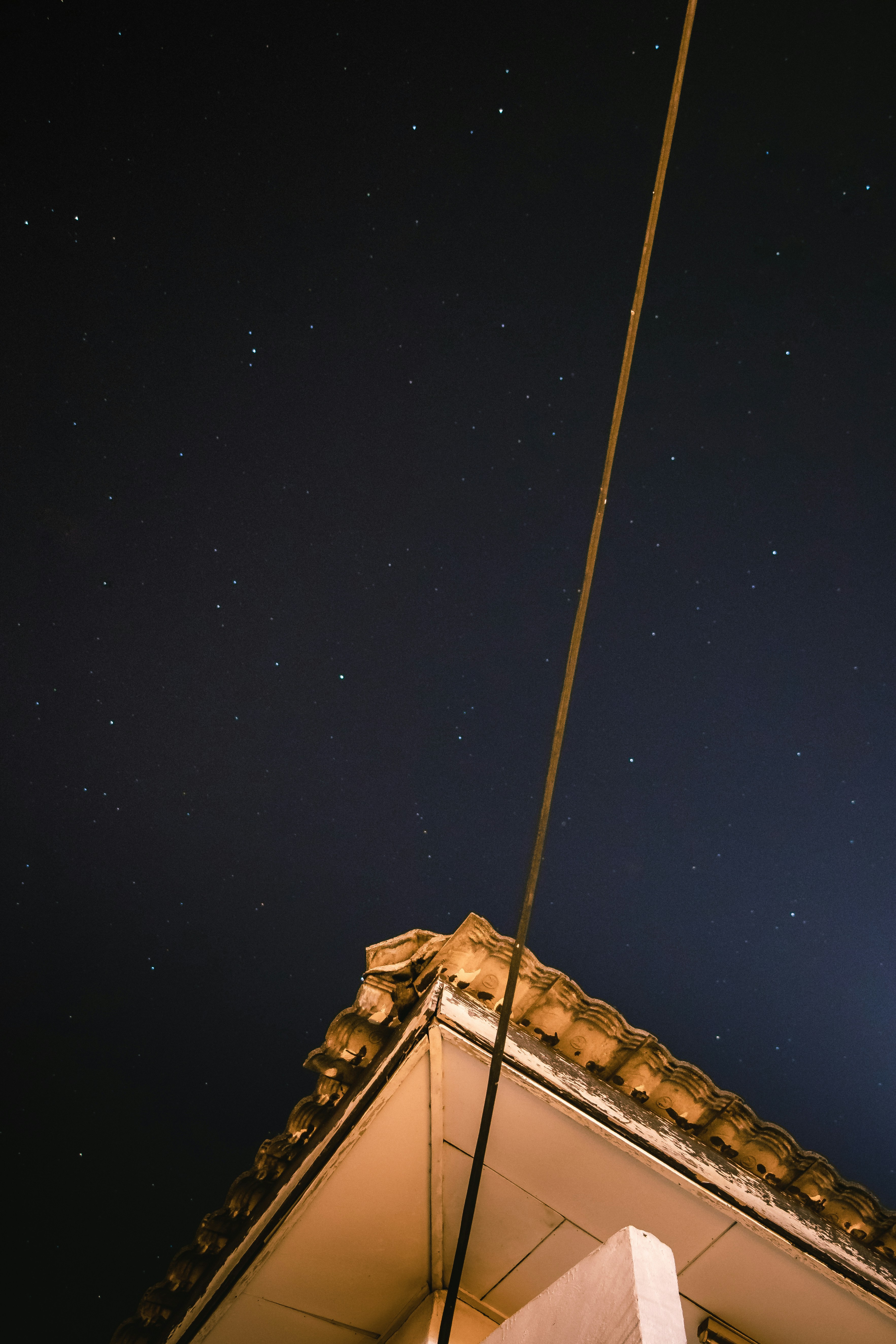 brown concrete building under starry night