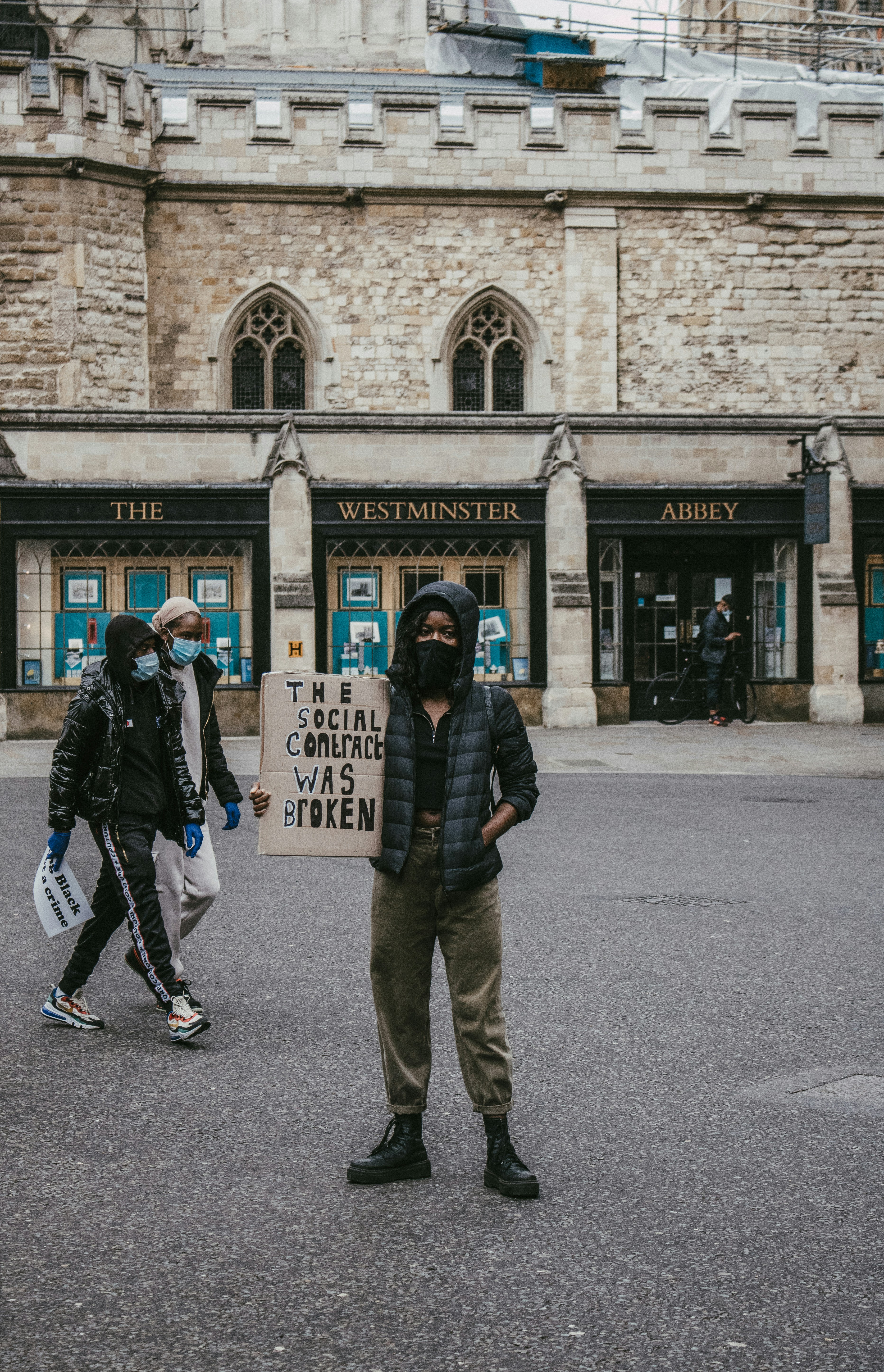 The Social Contract Was Broken: Masked Protester at Westminster Abbey