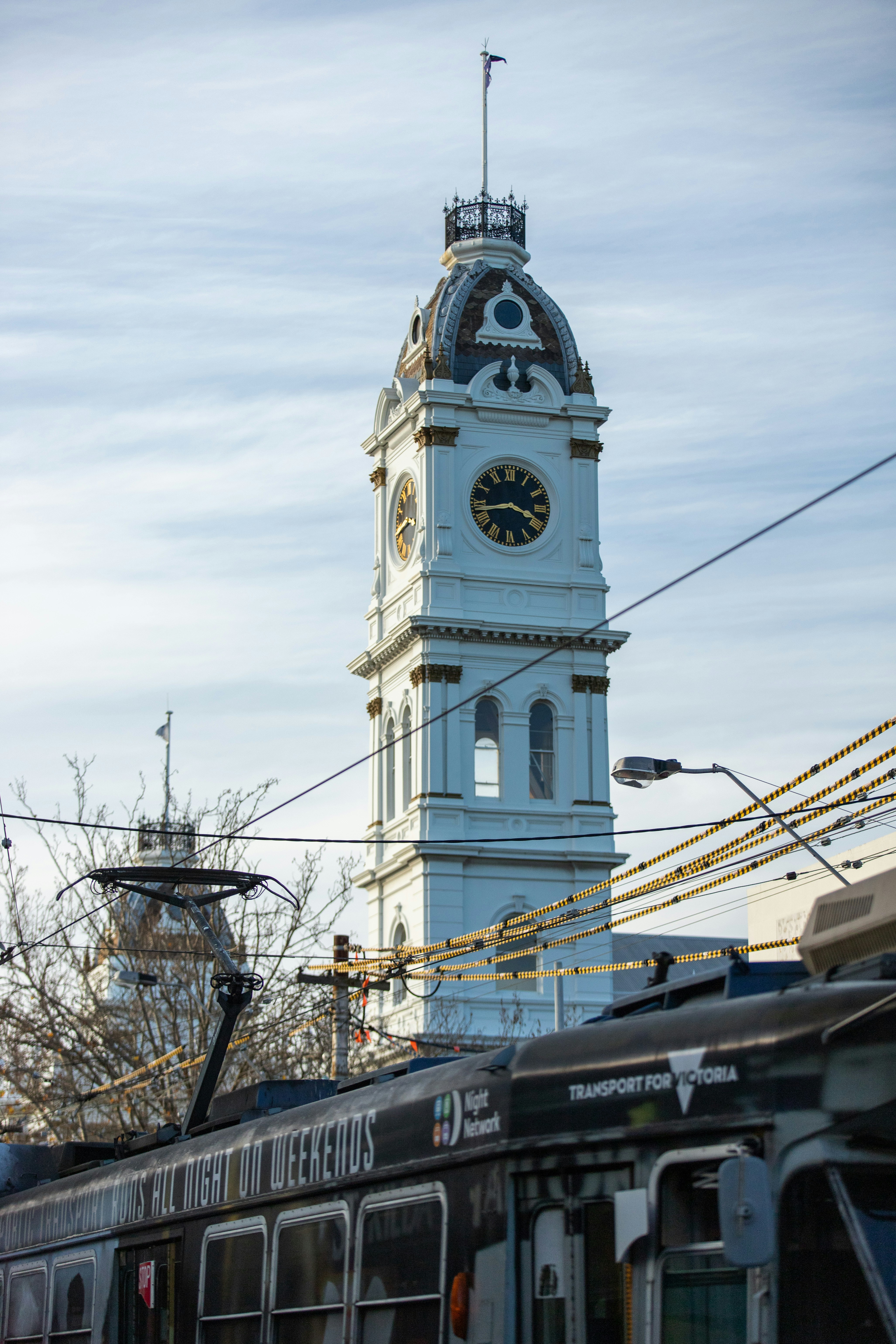 Clocktower and Tram: Timeless City Pulse