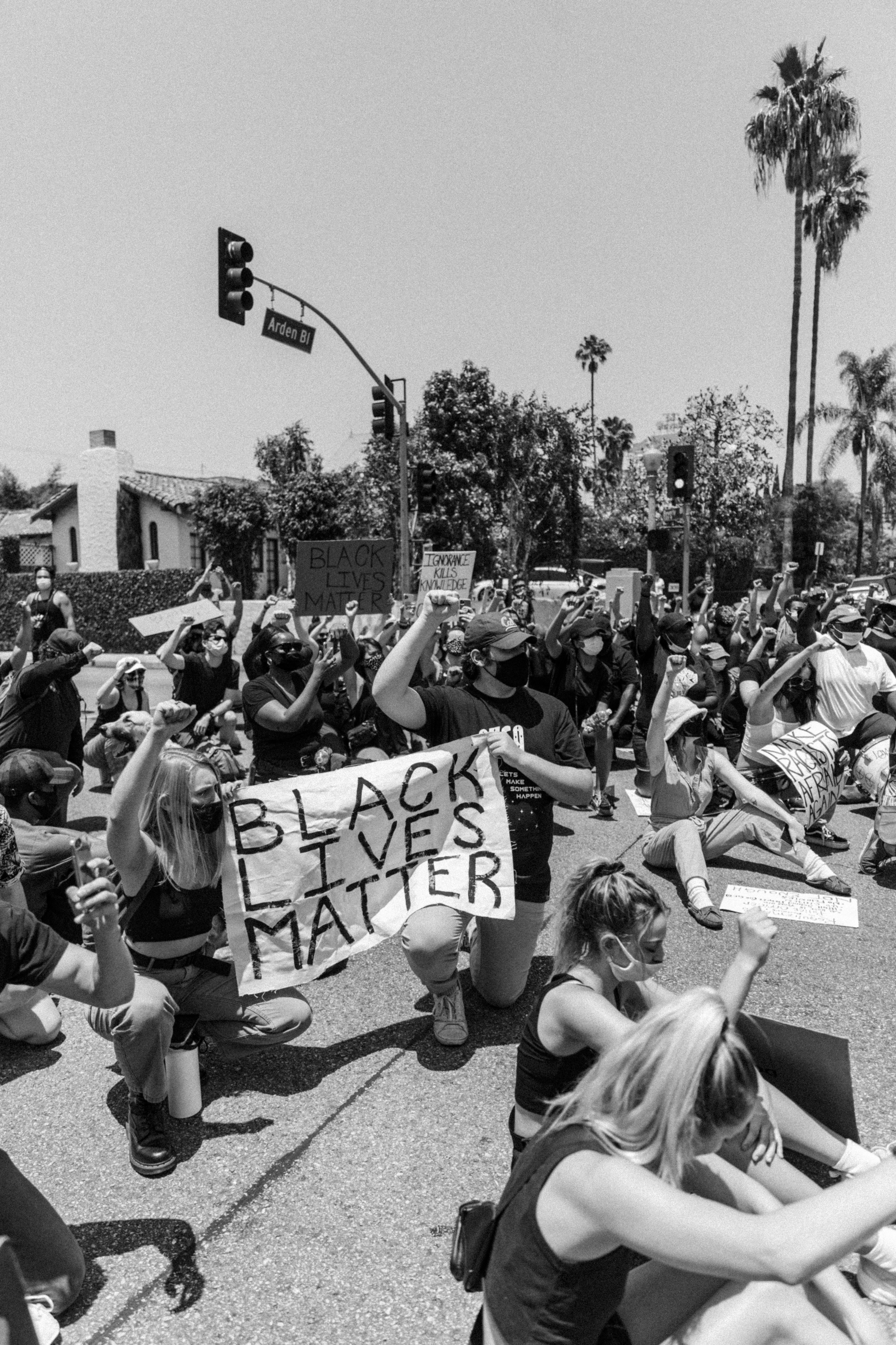 Grayscale photo of people sitting on bench photo – Free Protest Image ...