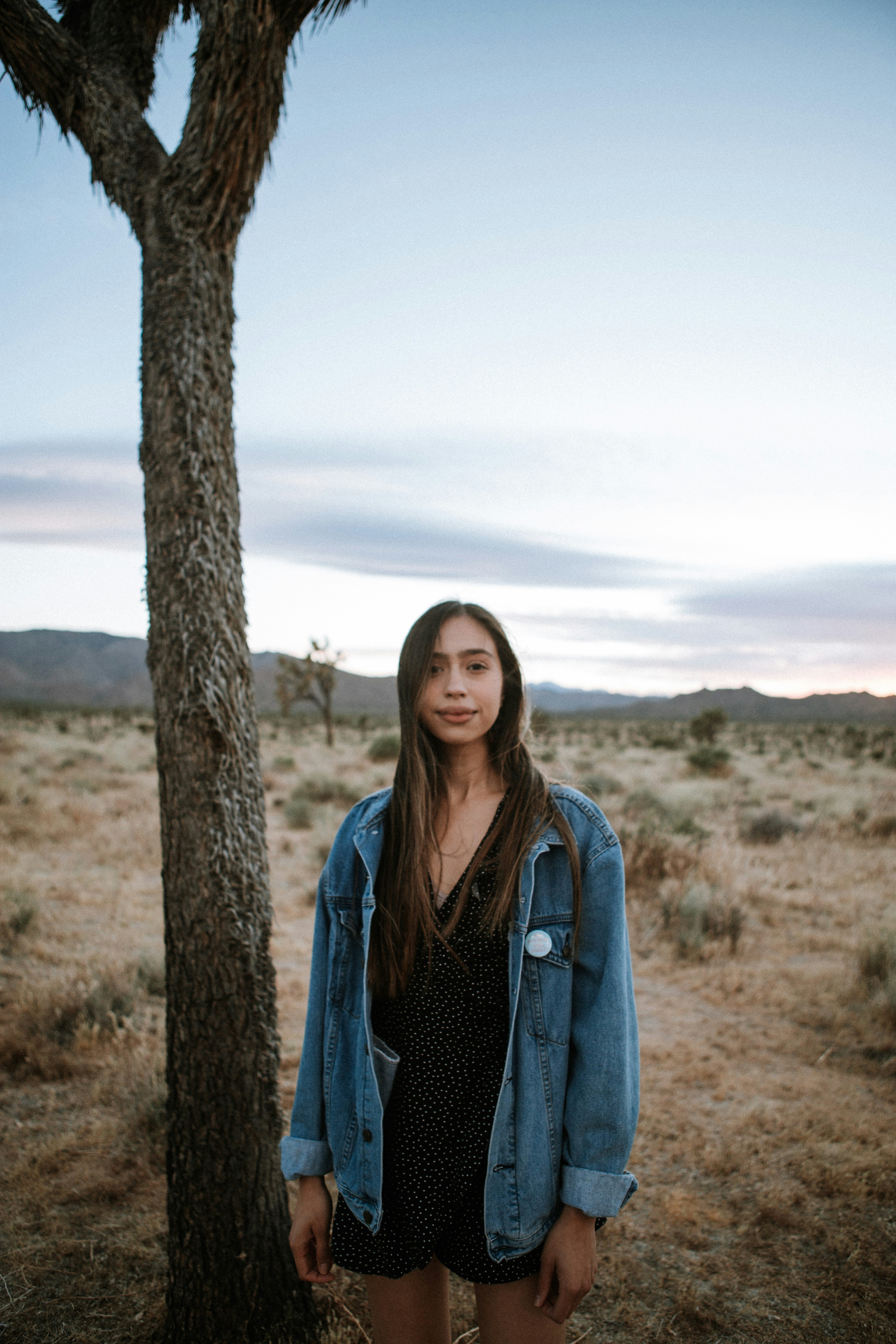 Desert Quiet: Denim-Clad Portrait at Dusk