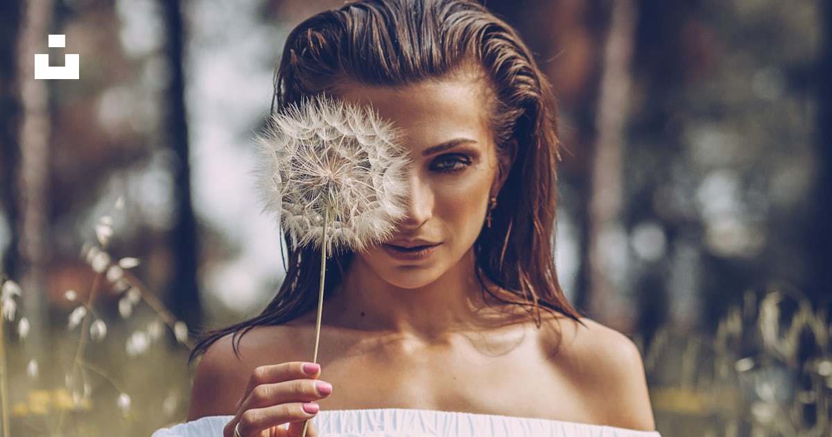Woman In White Off Shoulder Dress Holding Dandelion Flower Photo Free