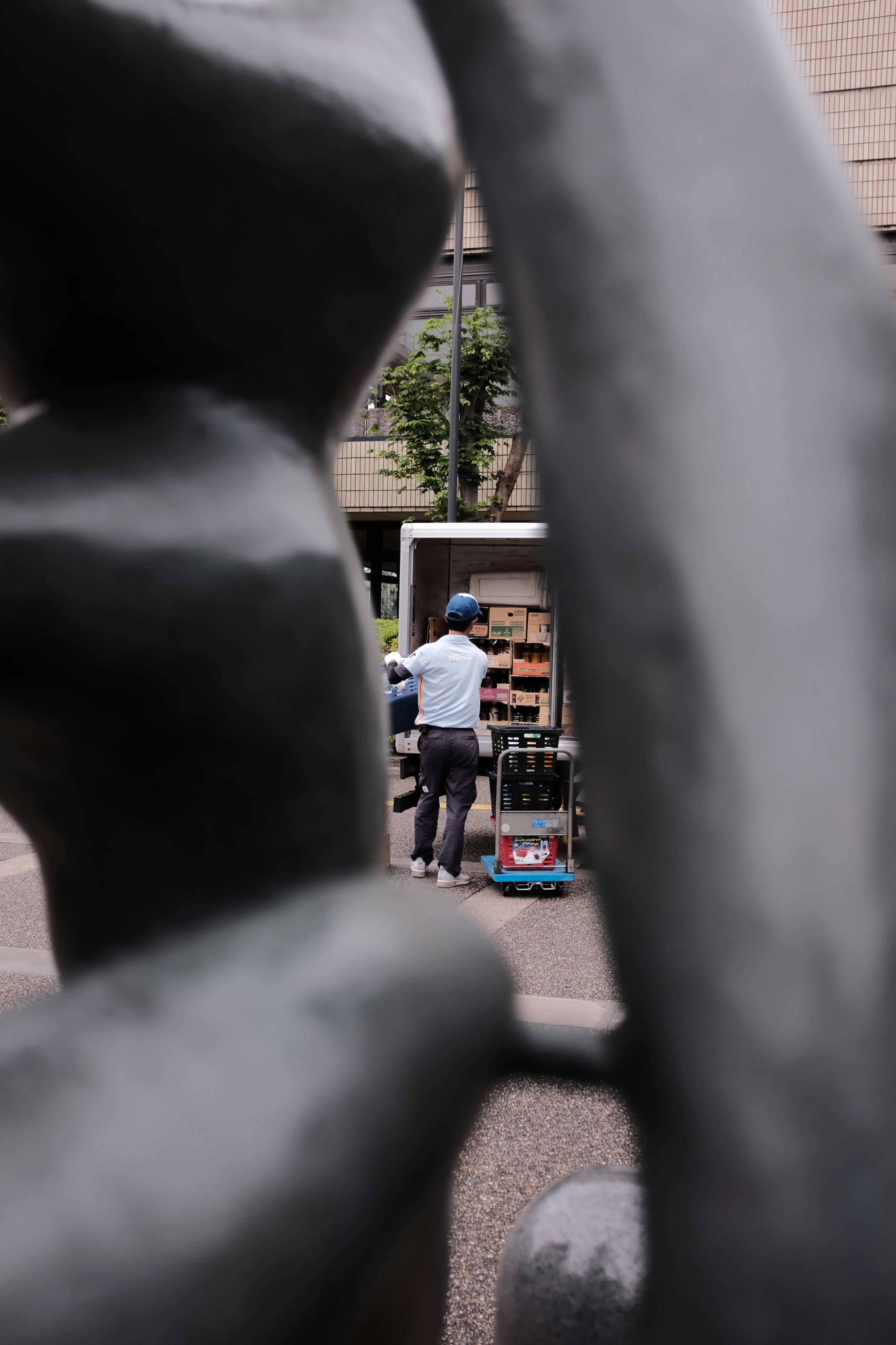 Through the Frame: A Street Vendor’s Quiet Servitude to a Hidden World