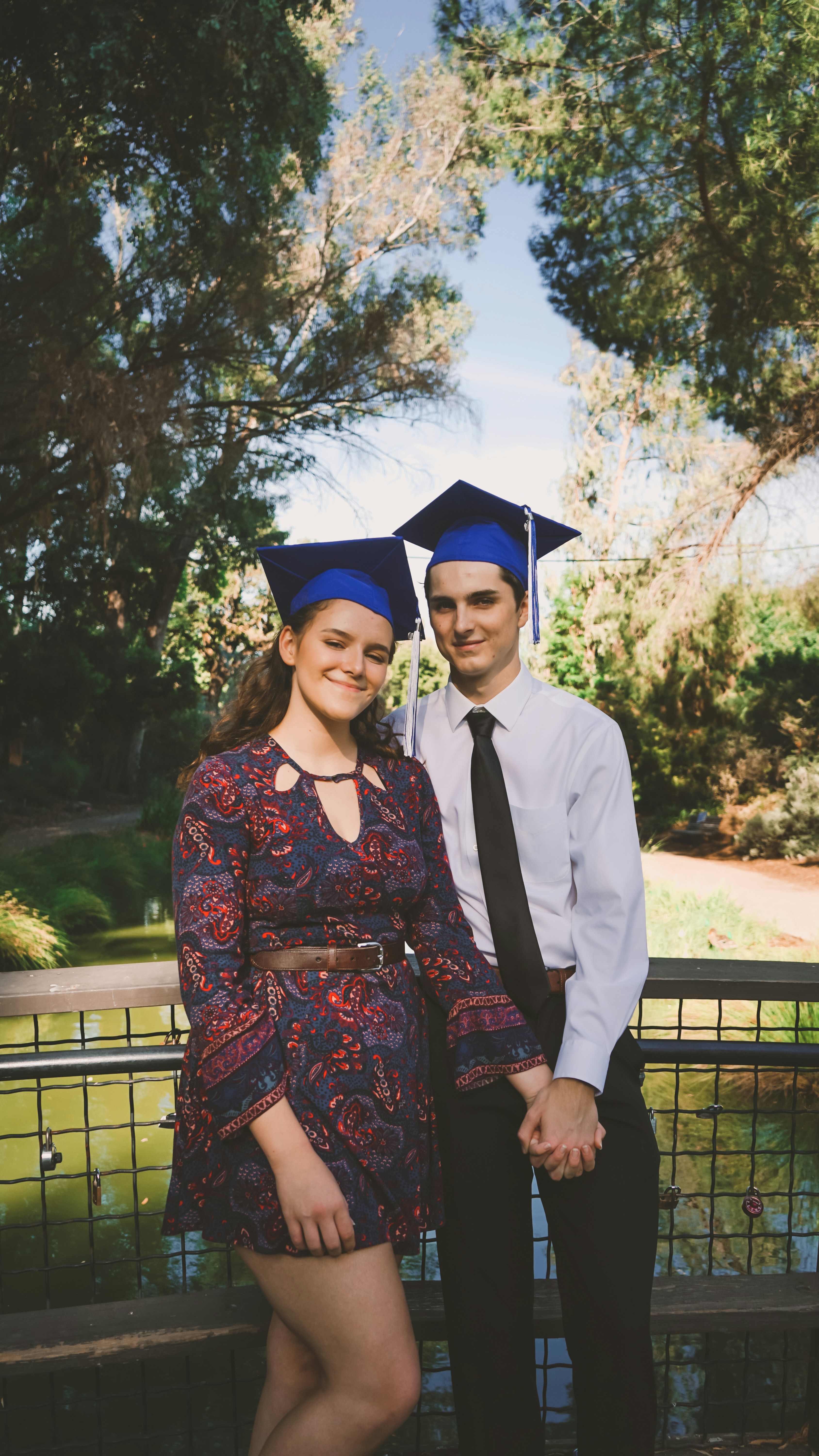 Woman in blue academic gown and white blazer photo – Free Davis Image ...