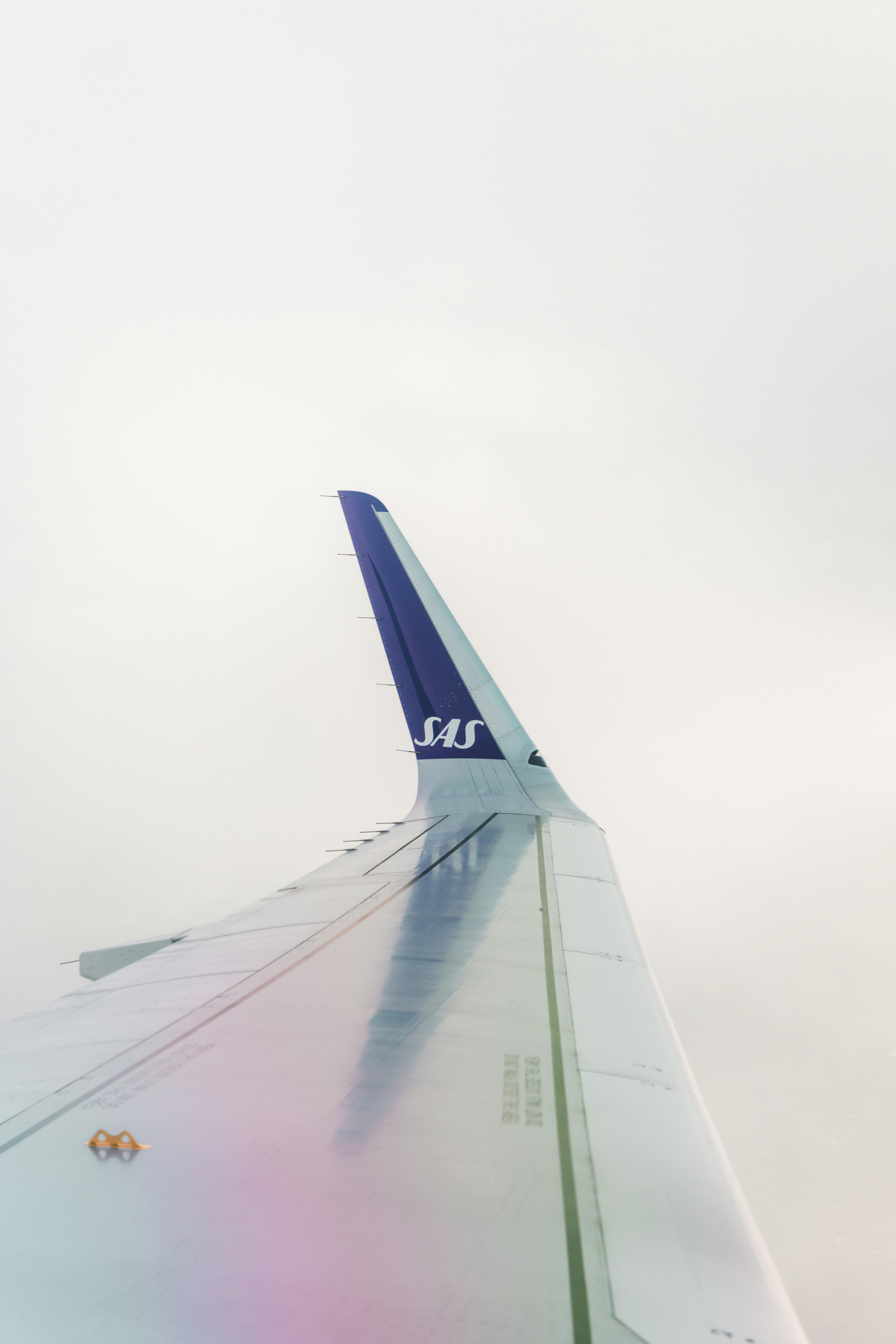 White and blue airplane wing photo – Free Copenhagen Image on Unsplash