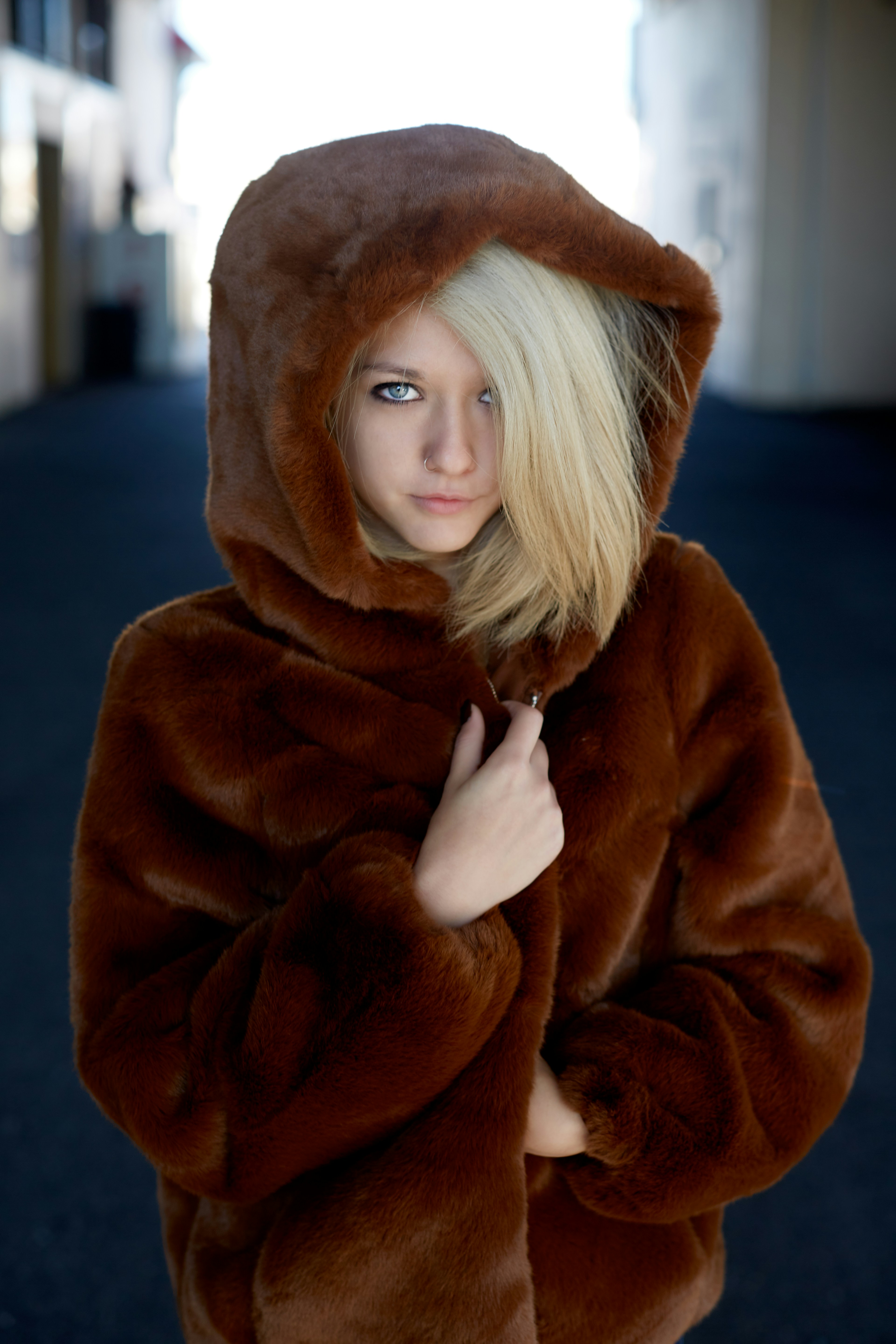 Hooded Velvet Portrait: Quiet Confidence in an Urban Alley