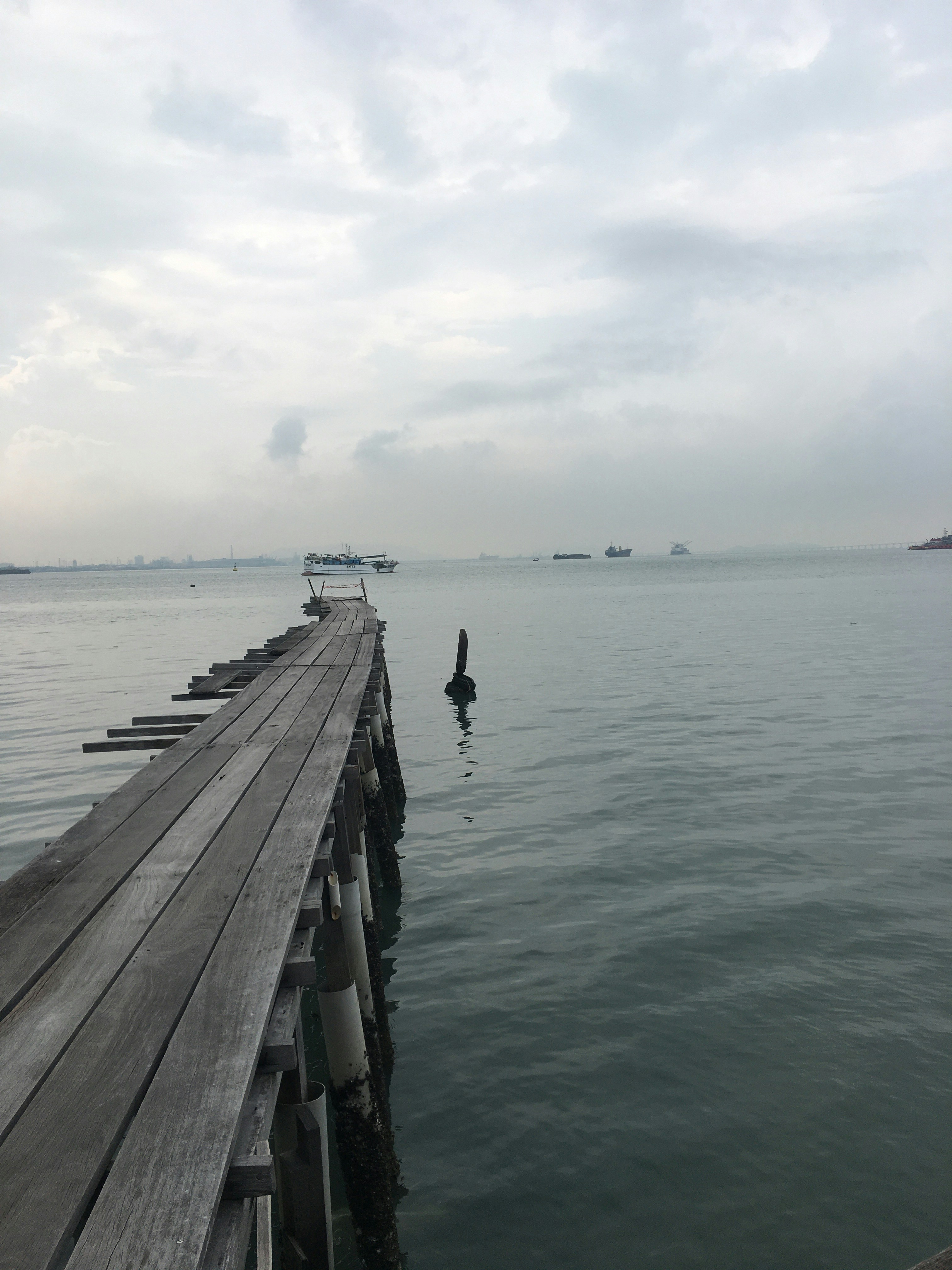 People on wooden dock over the sea during daytime photo – Free Building ...