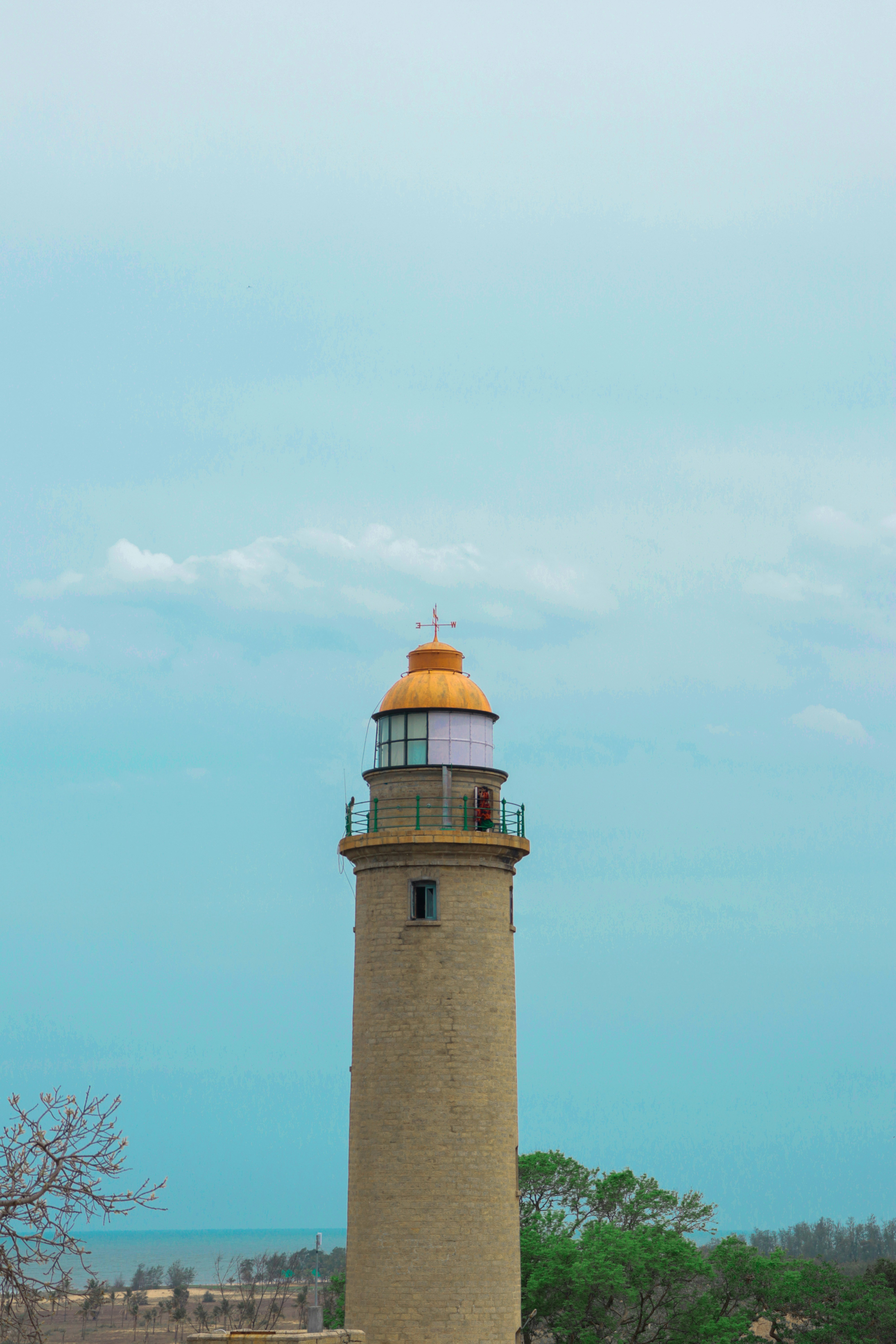 White and brown lighthouse under blue sky during daytime photo – Free ...
