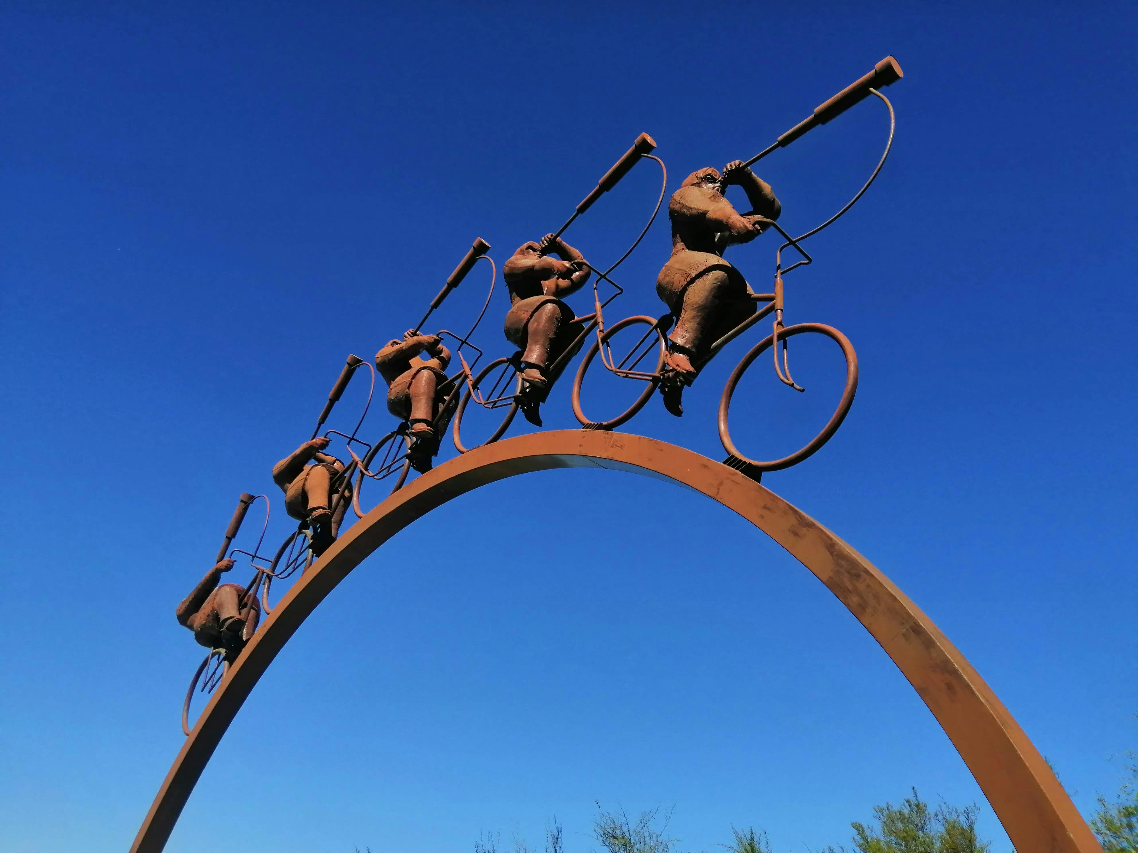 Riders on a Dawn-Blue Arch