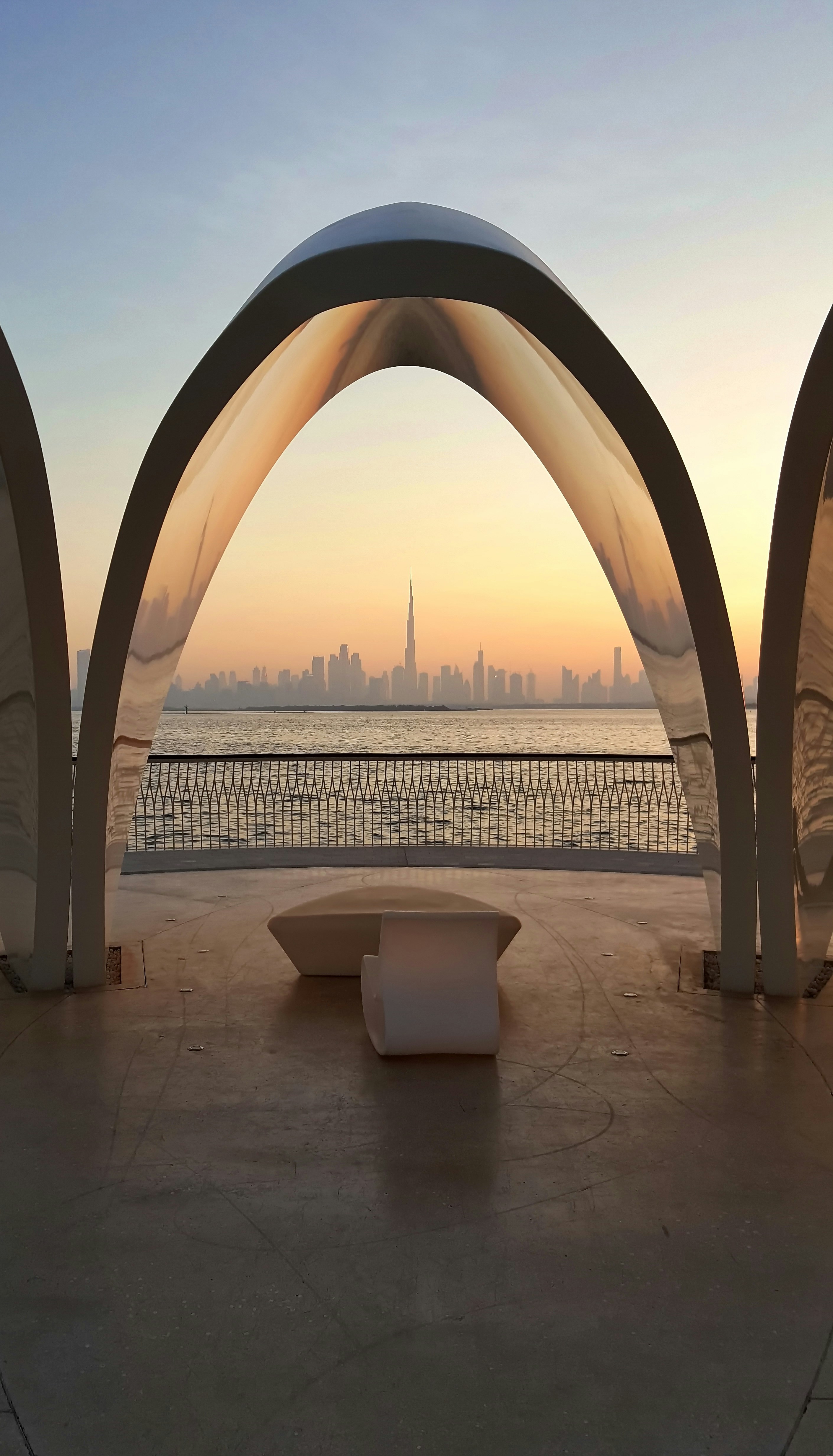 White concrete pillar near body of water during daytime photo – Free ...
