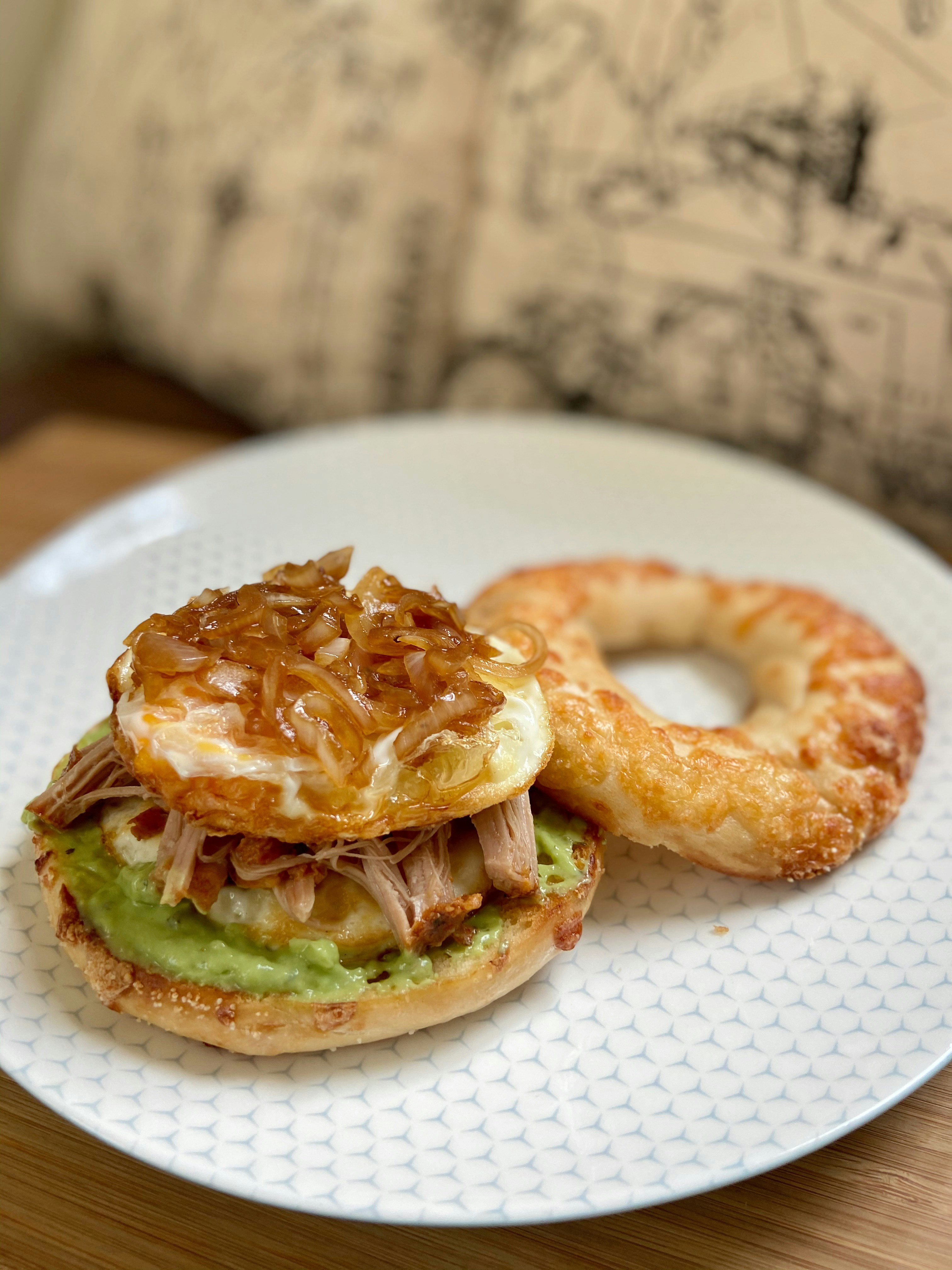 Bagel Stack Duet: Avocado Spread, Tender Meat, and a Crown of Caramelized Onions