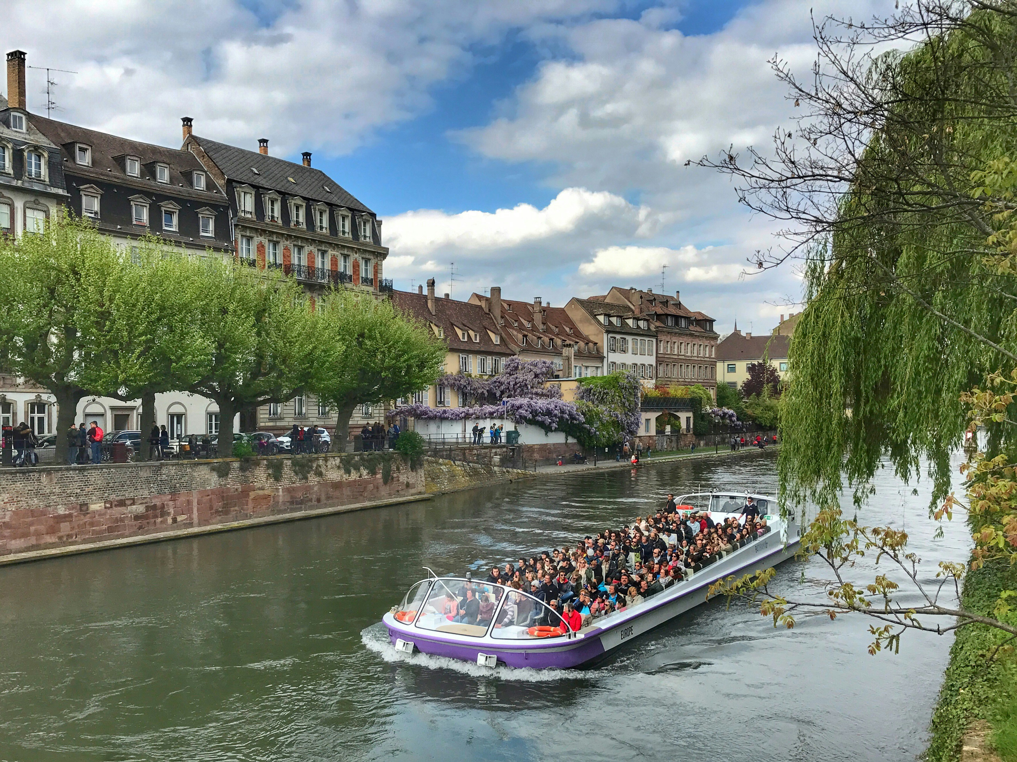 White and blue boat on river during daytime photo – Free Human Image on ...