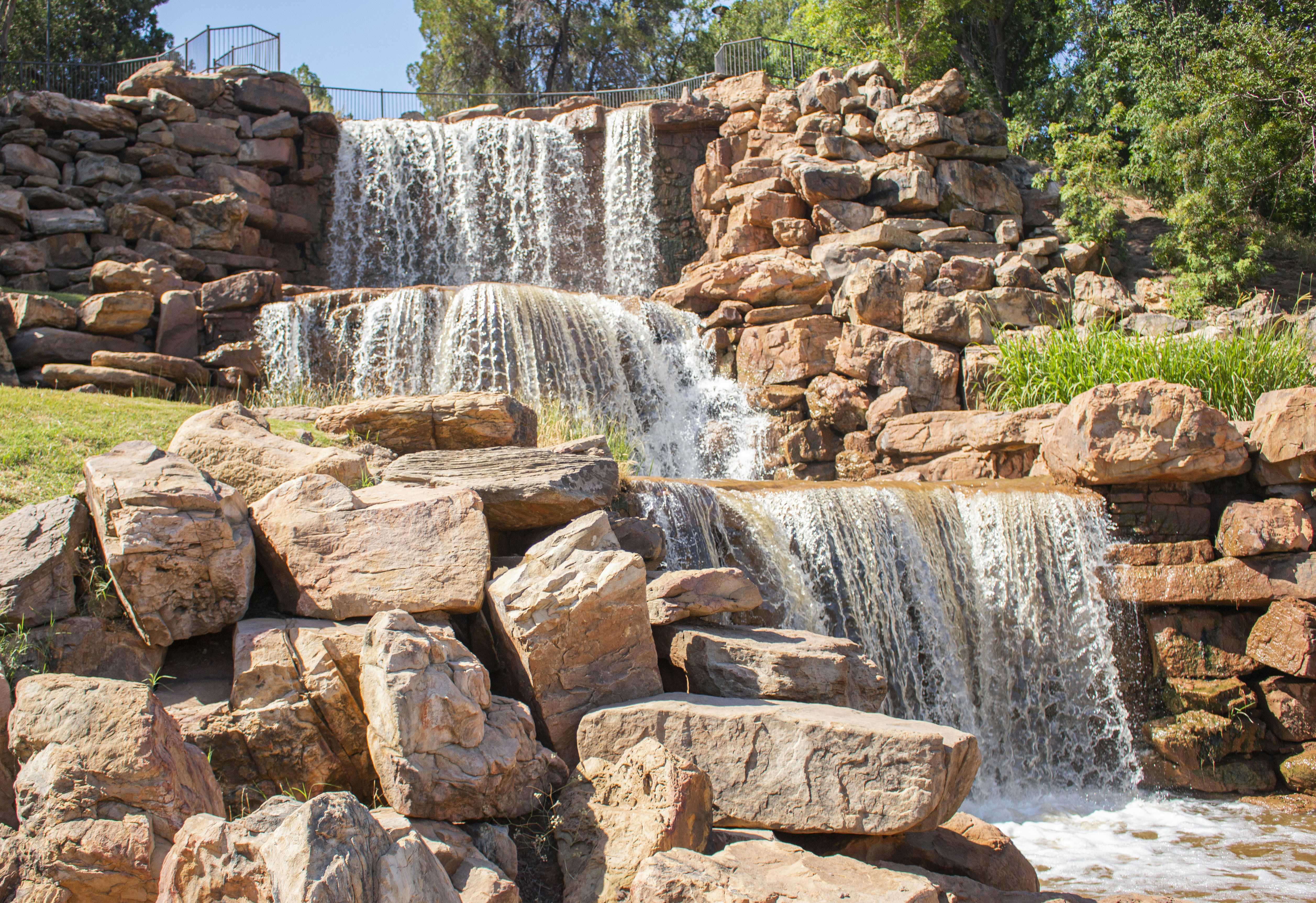 Sunlit Tiered Cascade over Rustic Granite Steps