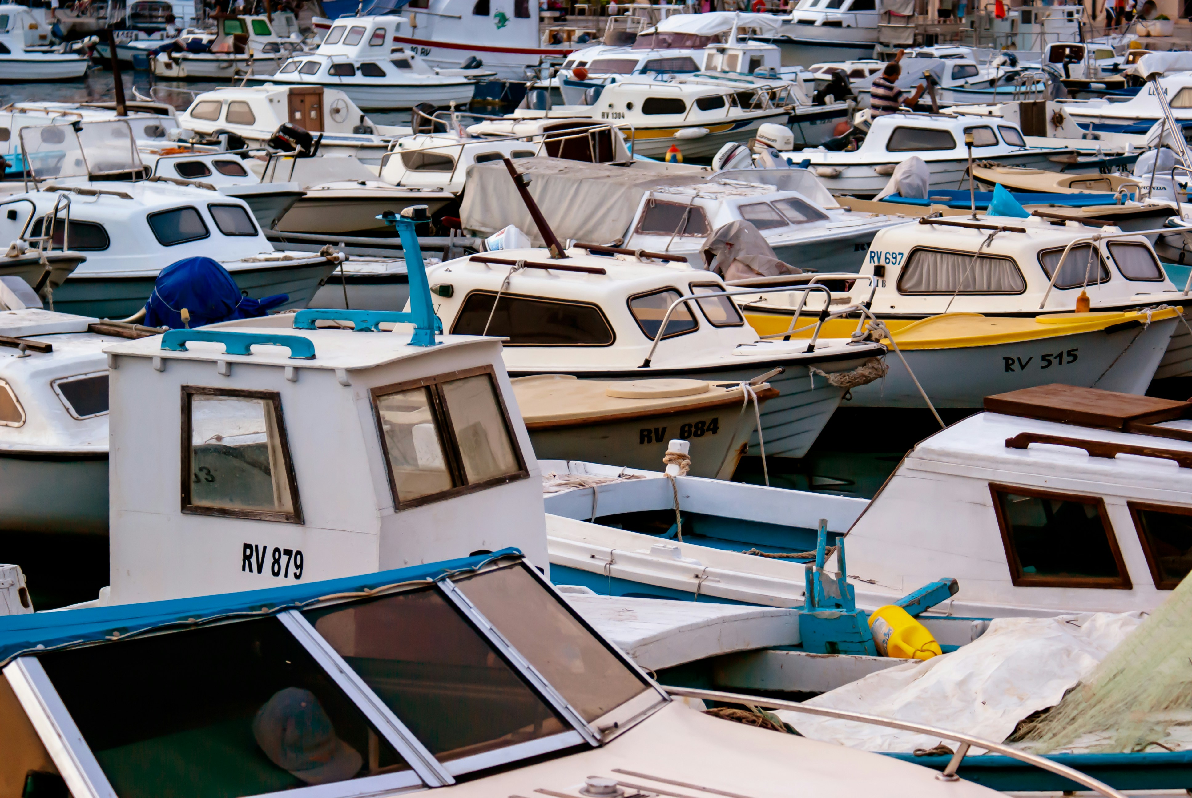 Harbor Mosaic: Sunlit White Hulls Packed in a Crowded Marina