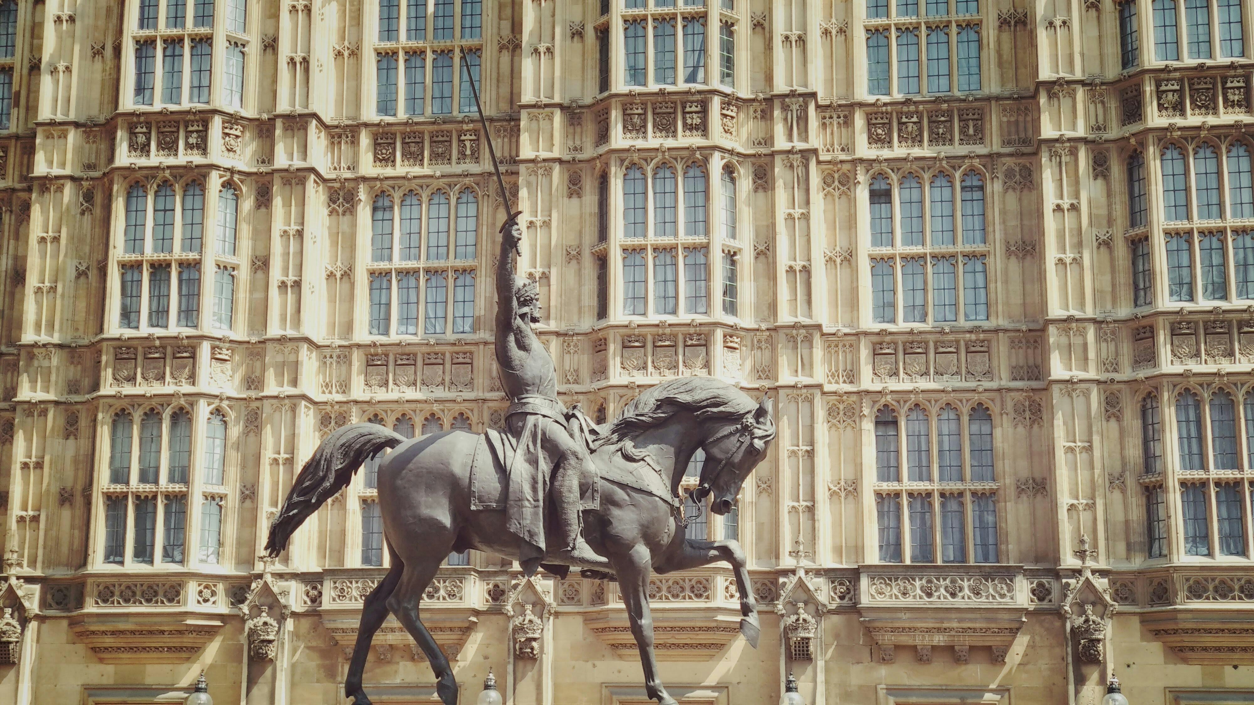 Equestrian Monument Against Architectural Grandeur