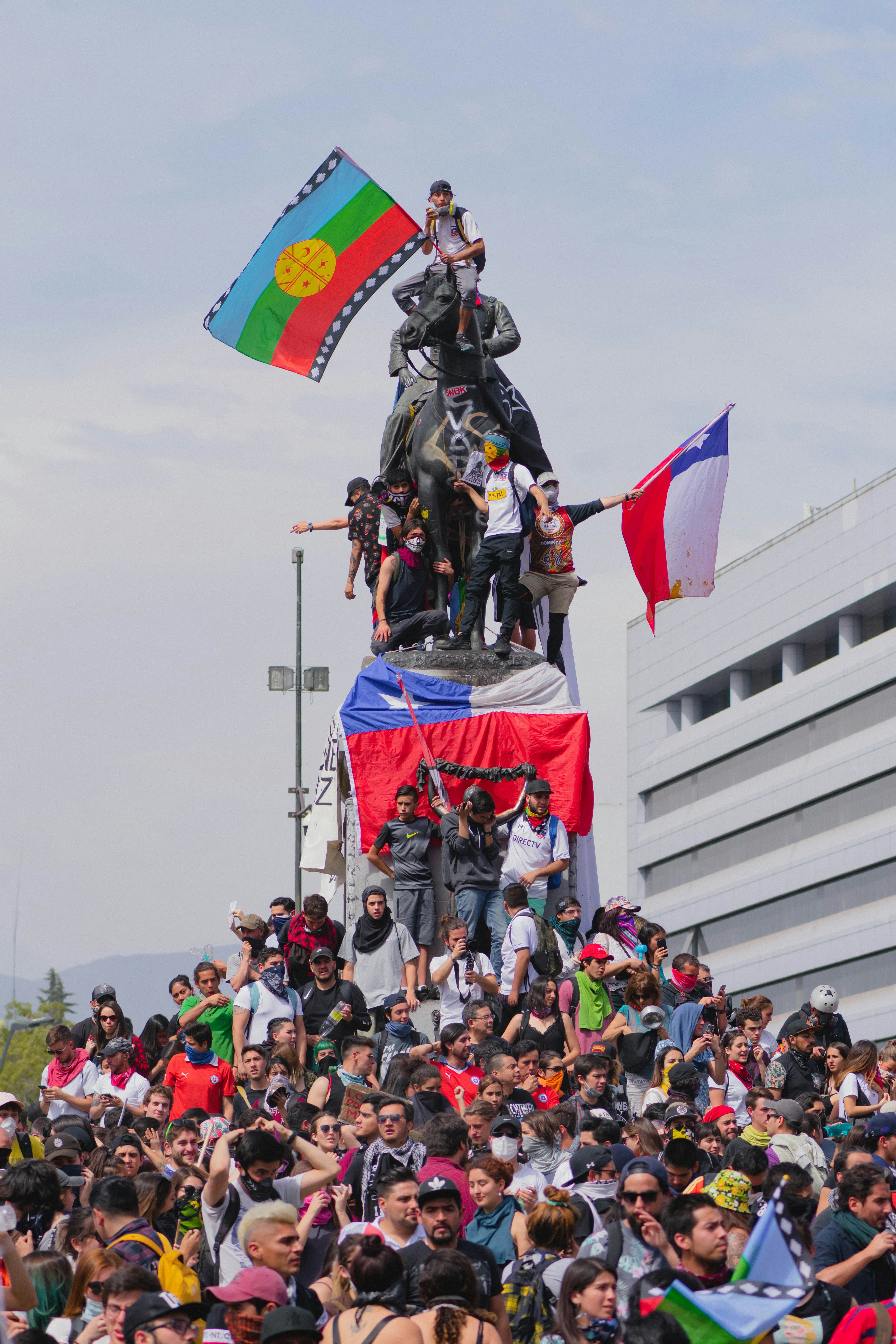 Flag Summit at the Monument: A Crowd Climbs to the Peak