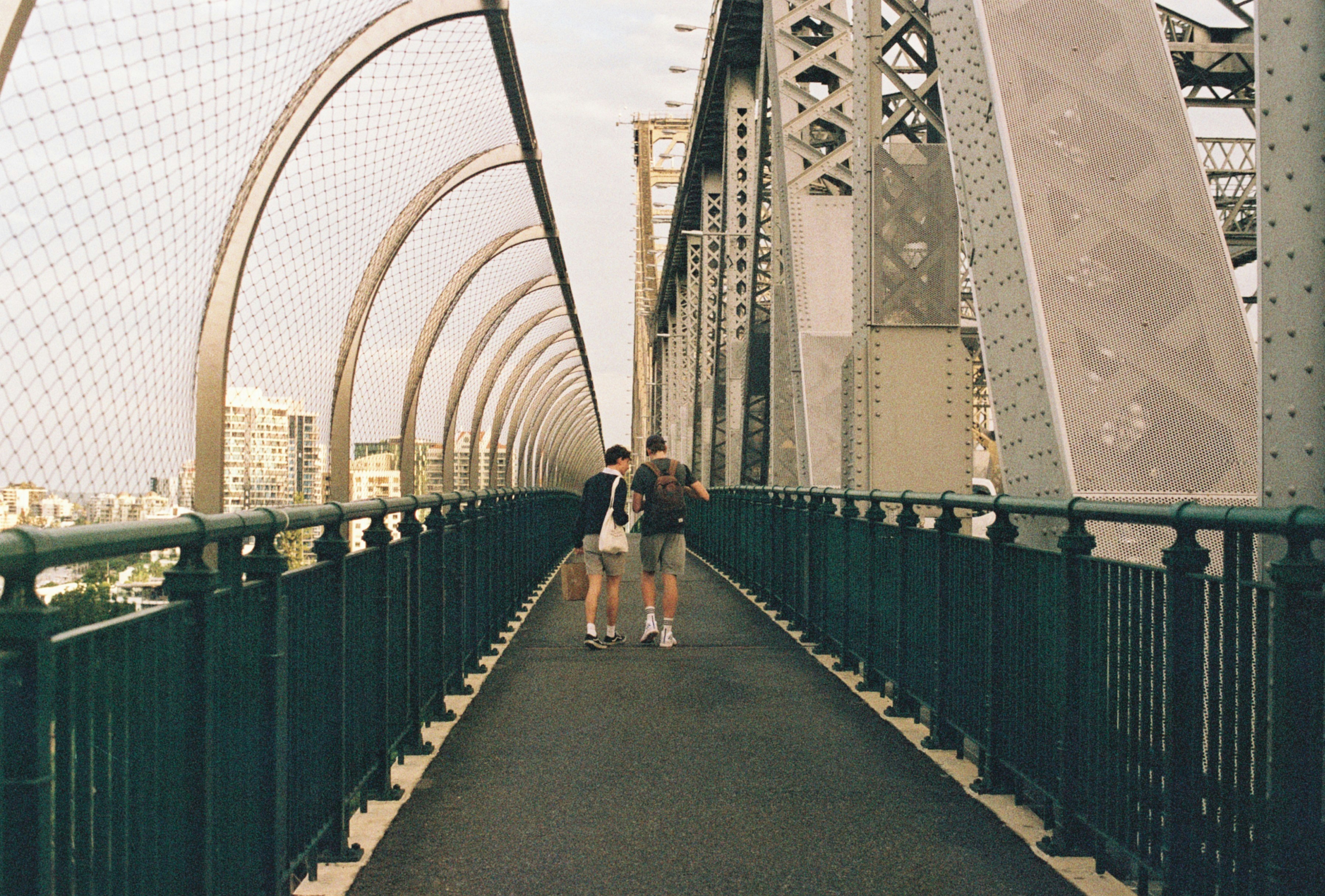 People walking on gray concrete bridge during daytime photo – Free Film ...