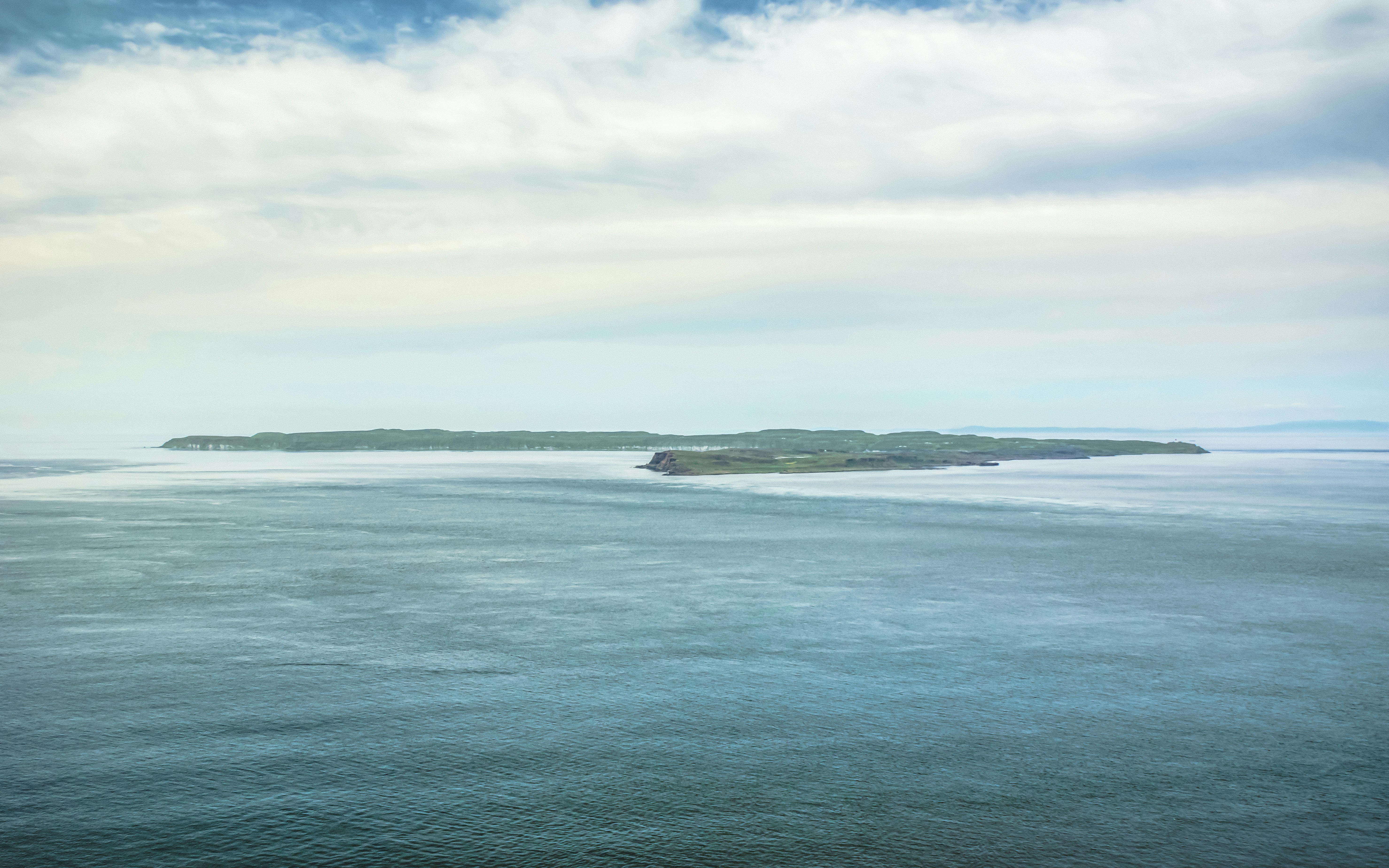 Isolated Island Arc on a Quiet Sea
