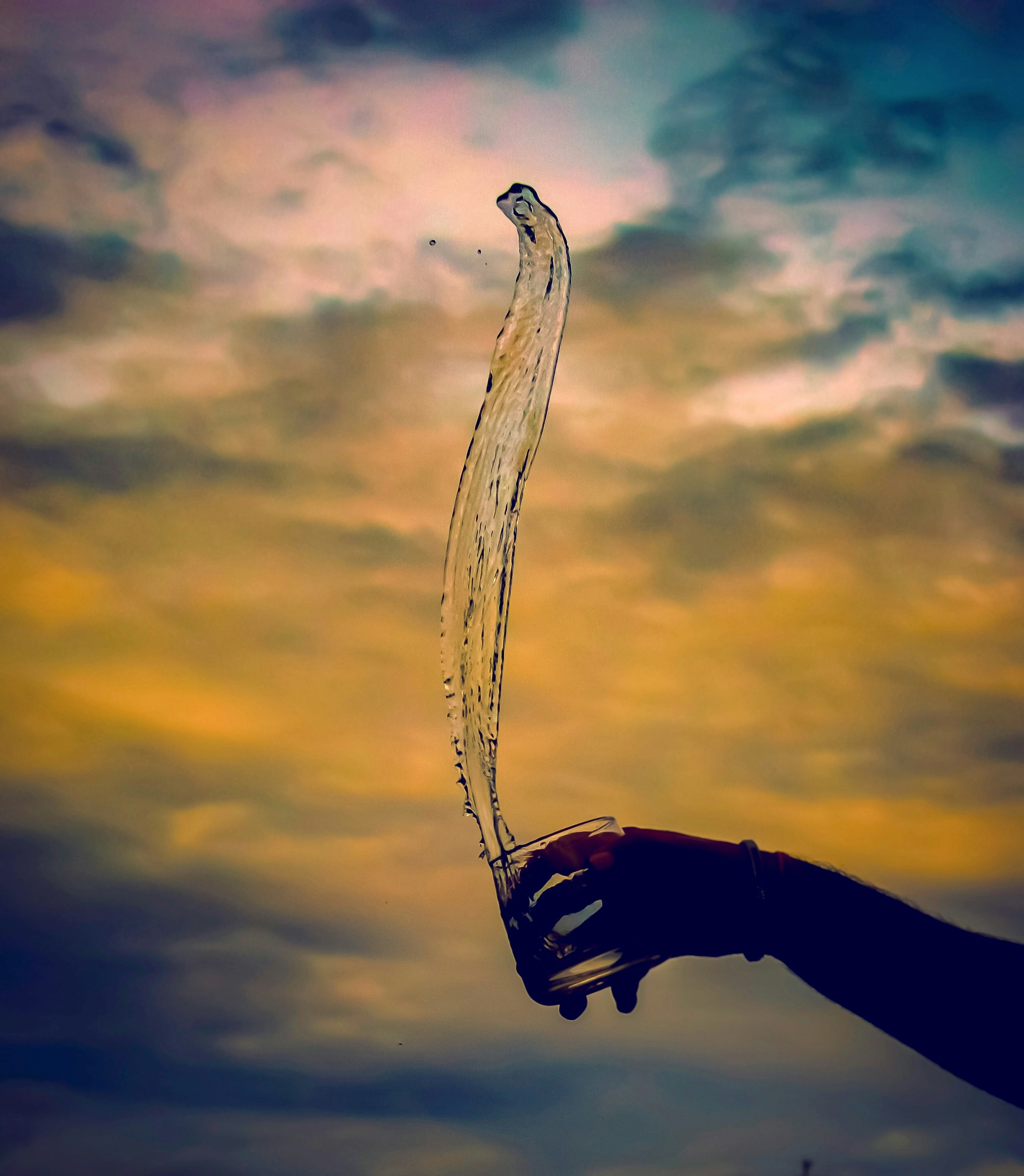 Person holding a water drop photo – Free Brown Image on Unsplash