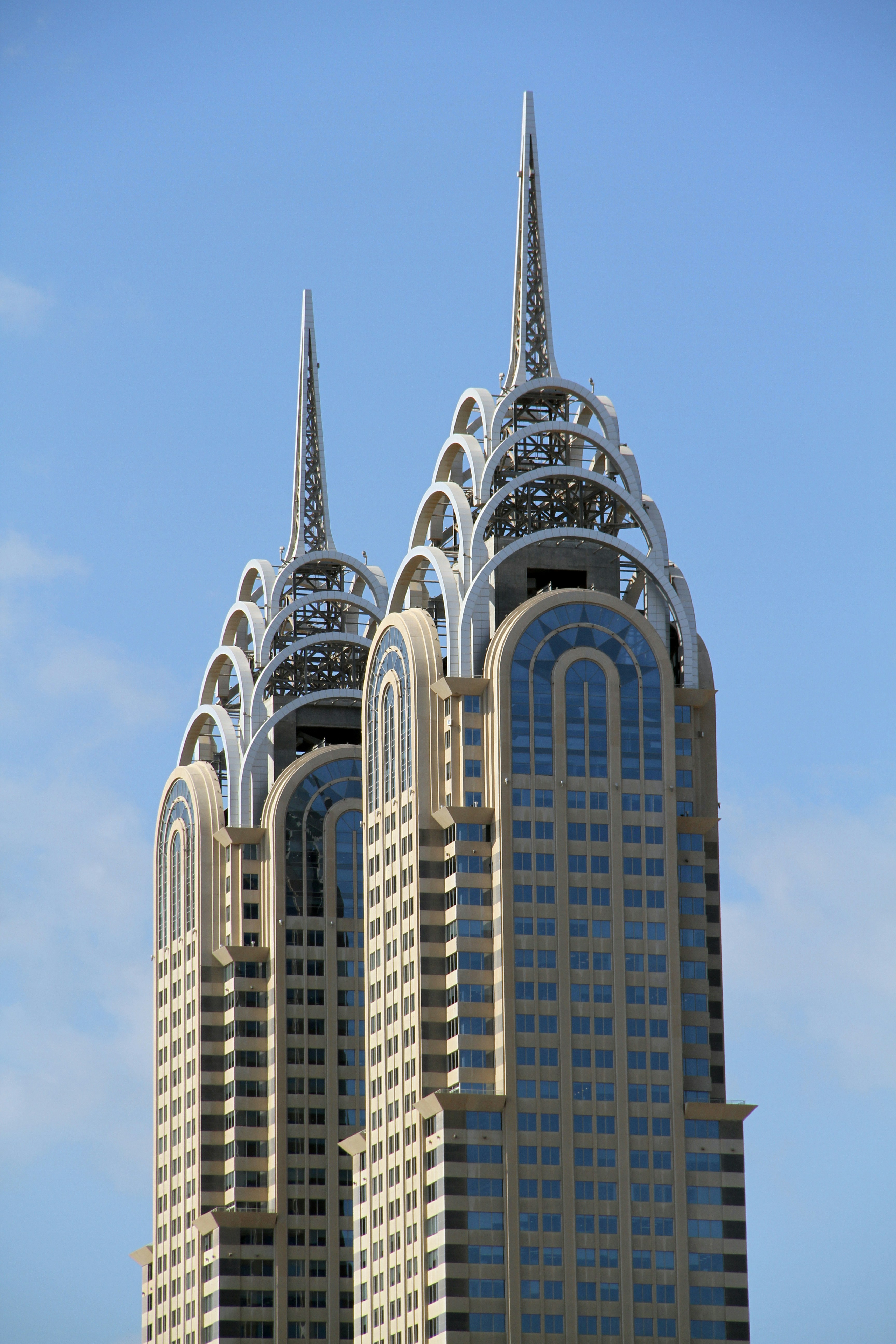 Tri-Spired Crown Pierces the Azure: A Neo-Art Deco Tower