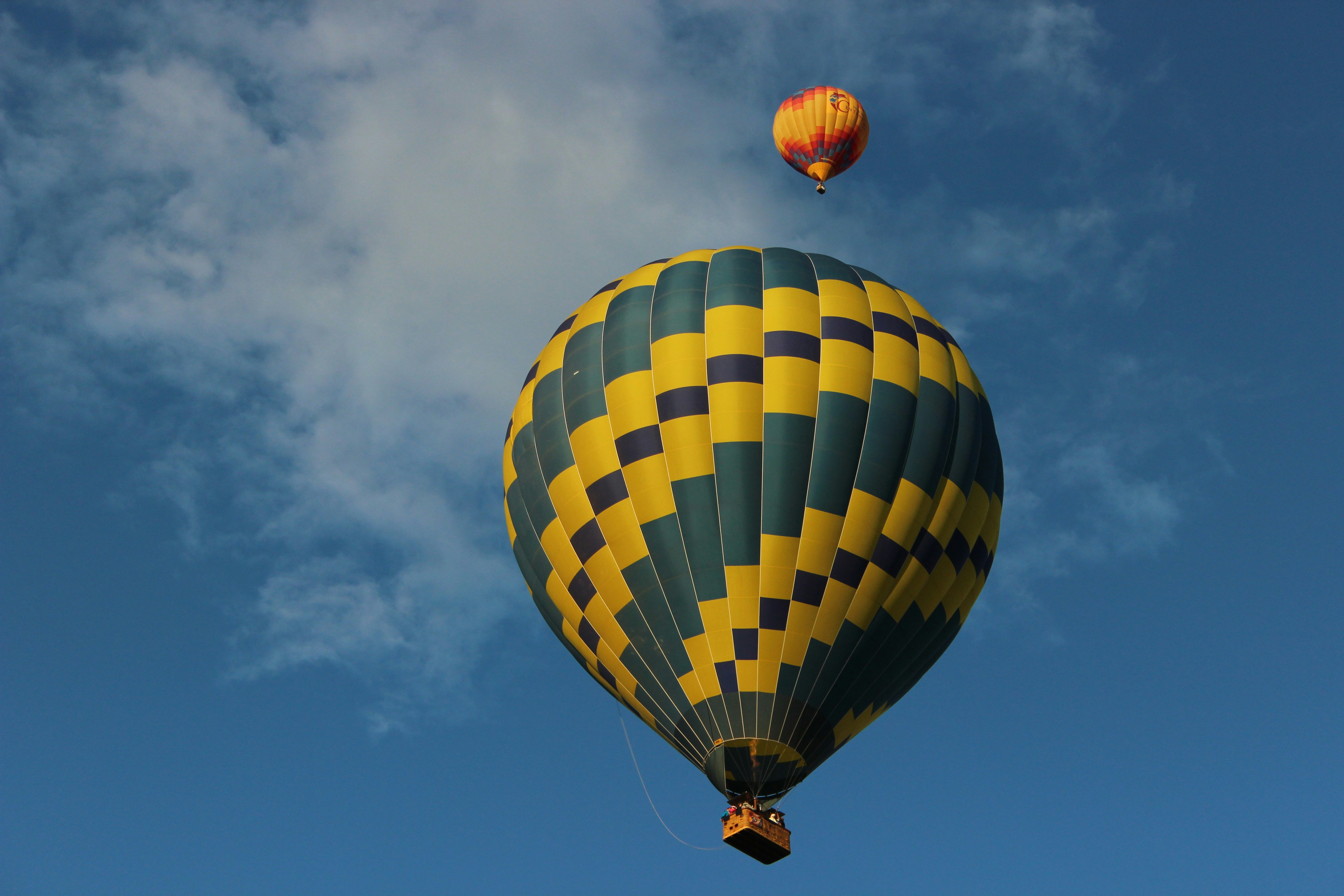 Green and yellow hot air balloon in mid air photo – Free Albuquerque ...