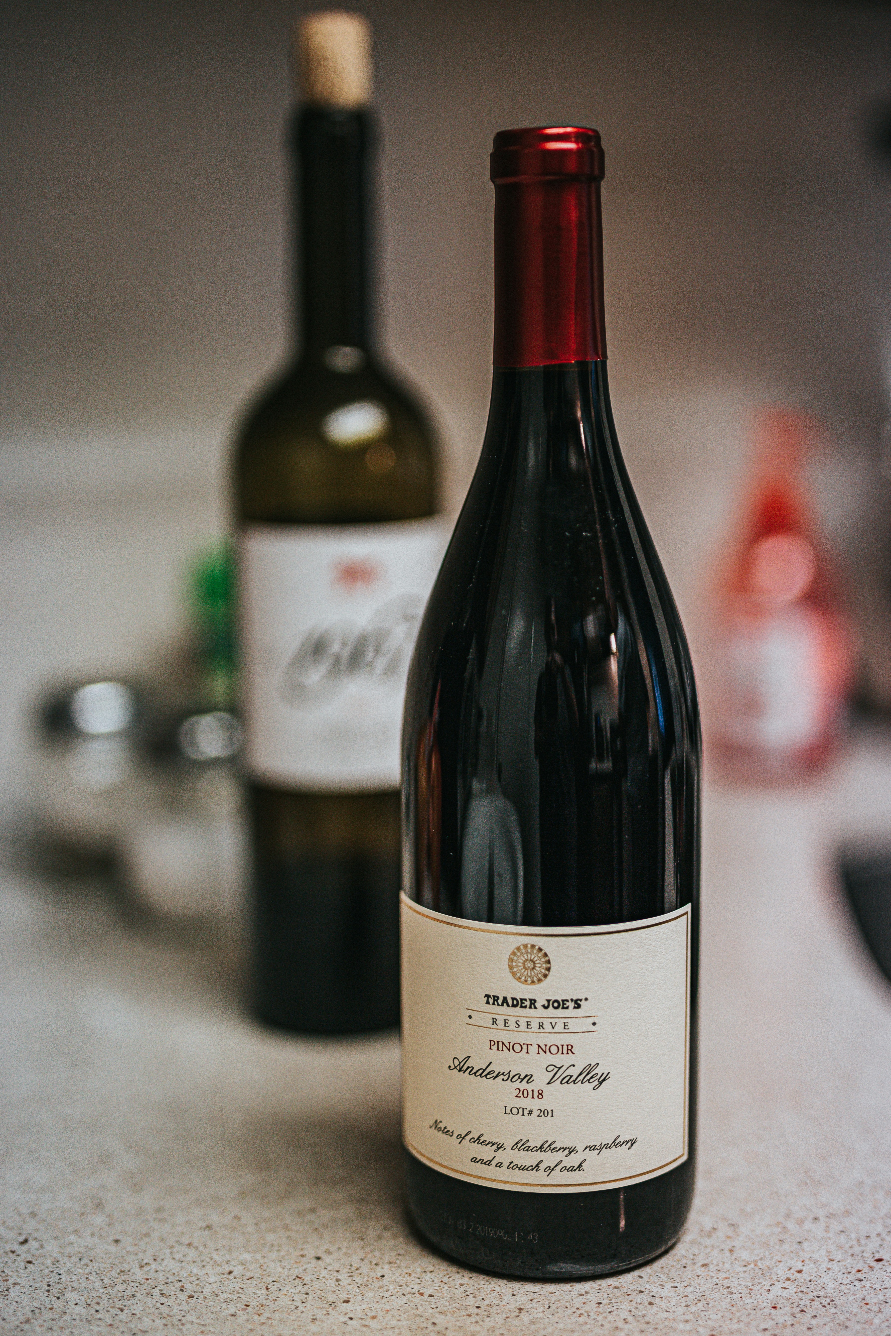 White and black labeled bottle photo – Free Beverage Image on Unsplash