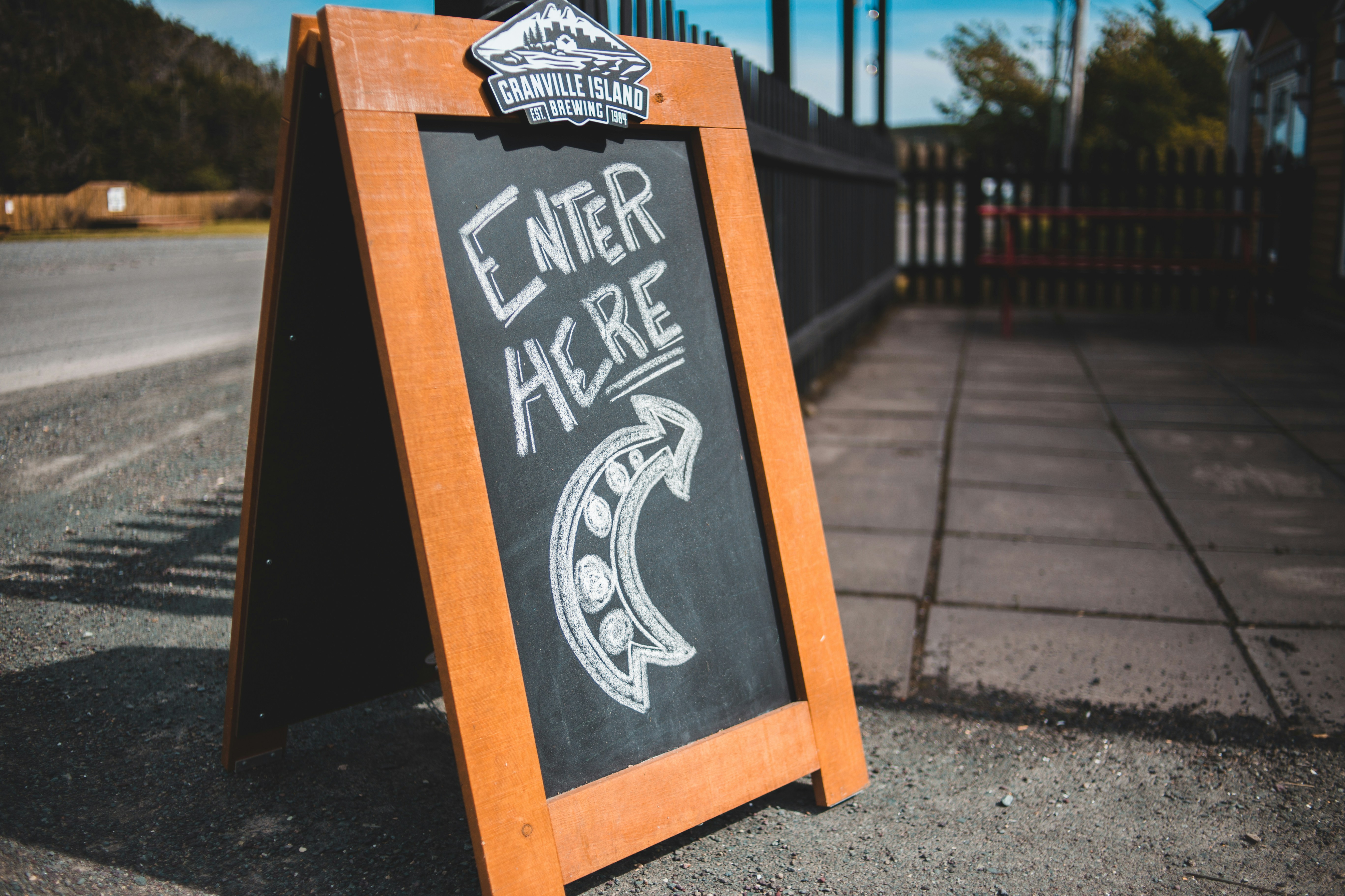 Chalkboard Alley: A Signboard by the Quiet Road