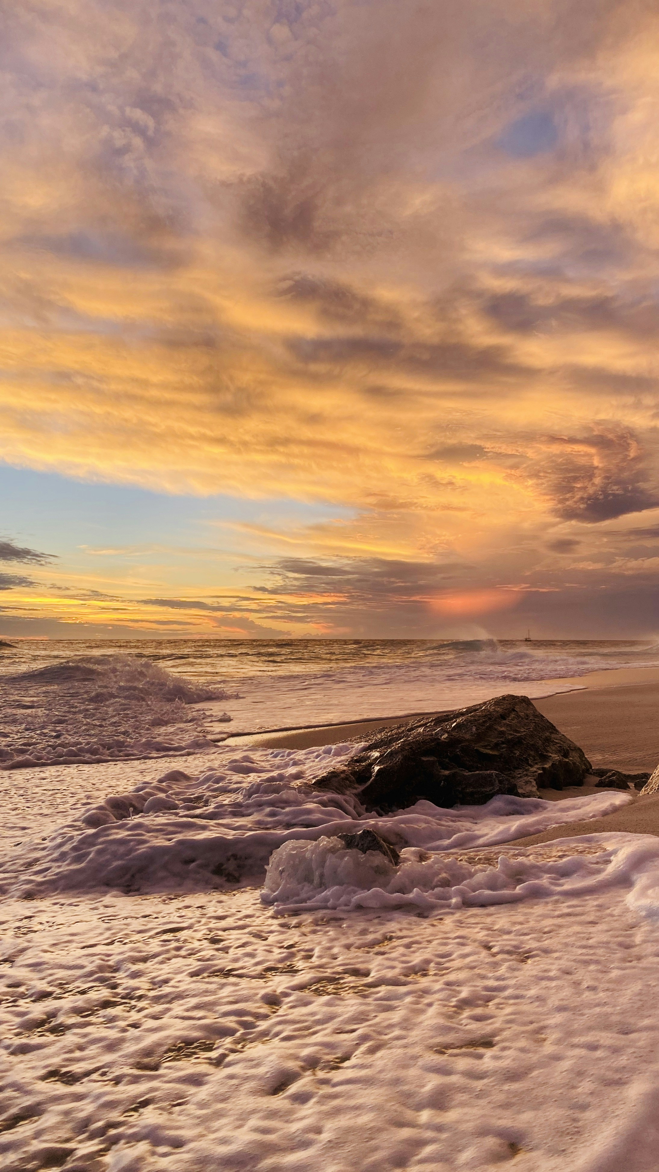 A beach covered in snow next to the ocean photo – Free Maldives Image ...