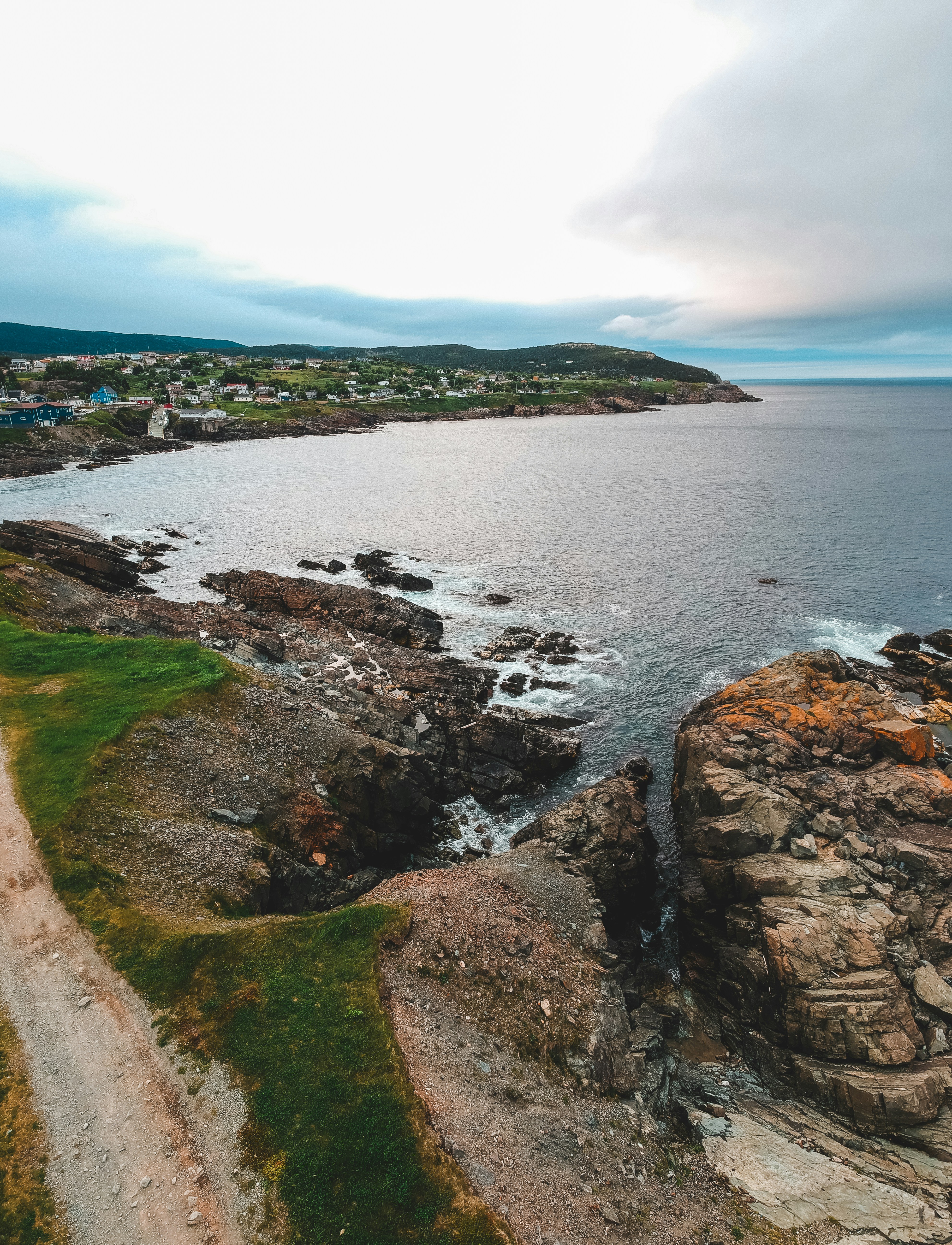 Cliffside Mosaic: Rugged Rocks Meet a Calm Atlantic