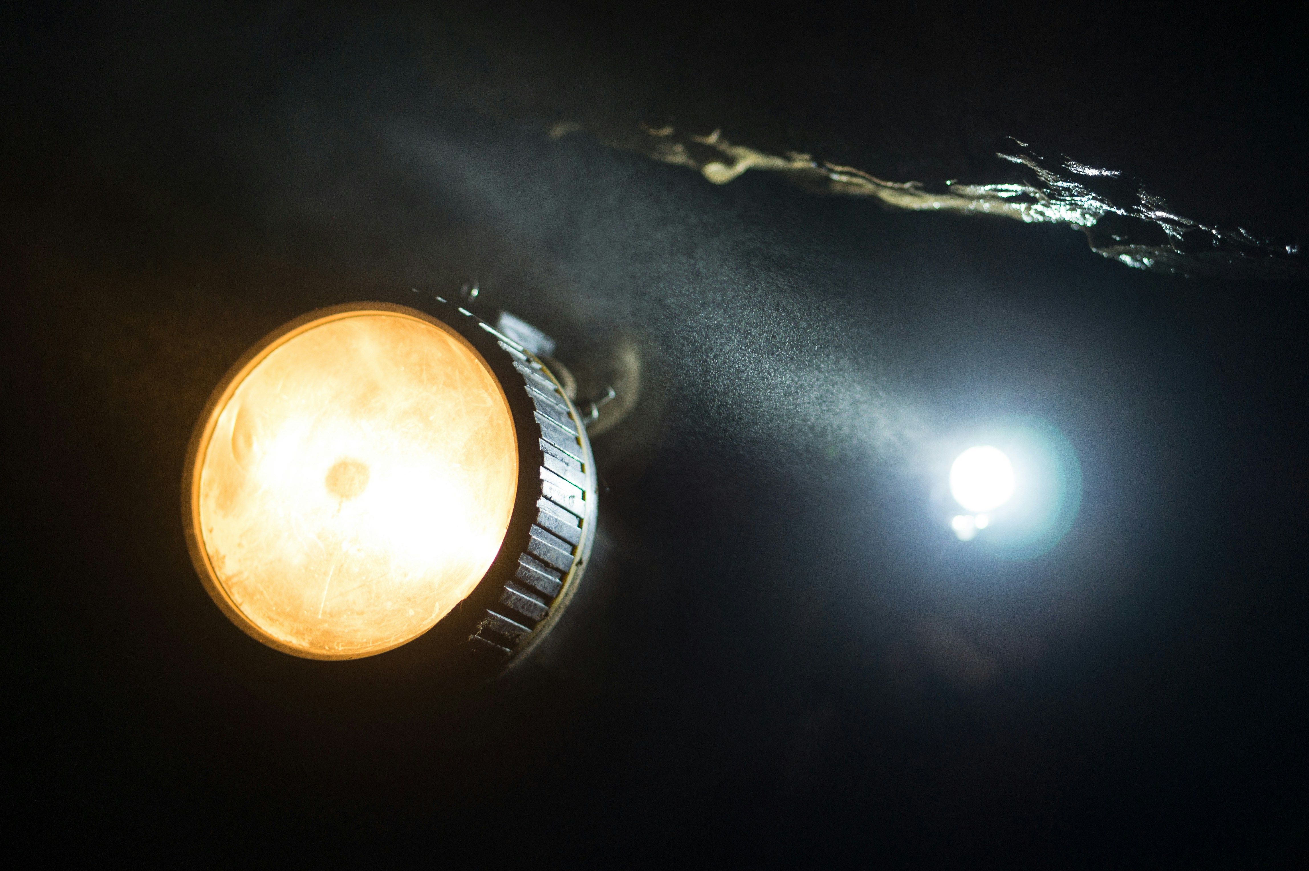 Amber Beacon and Cyan Sprite: A Minimalist Night-Light Portrait