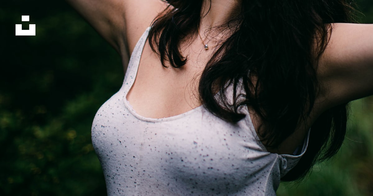 Woman In White Tank Top Holding Her Hair Photo Free Goddess Image On
