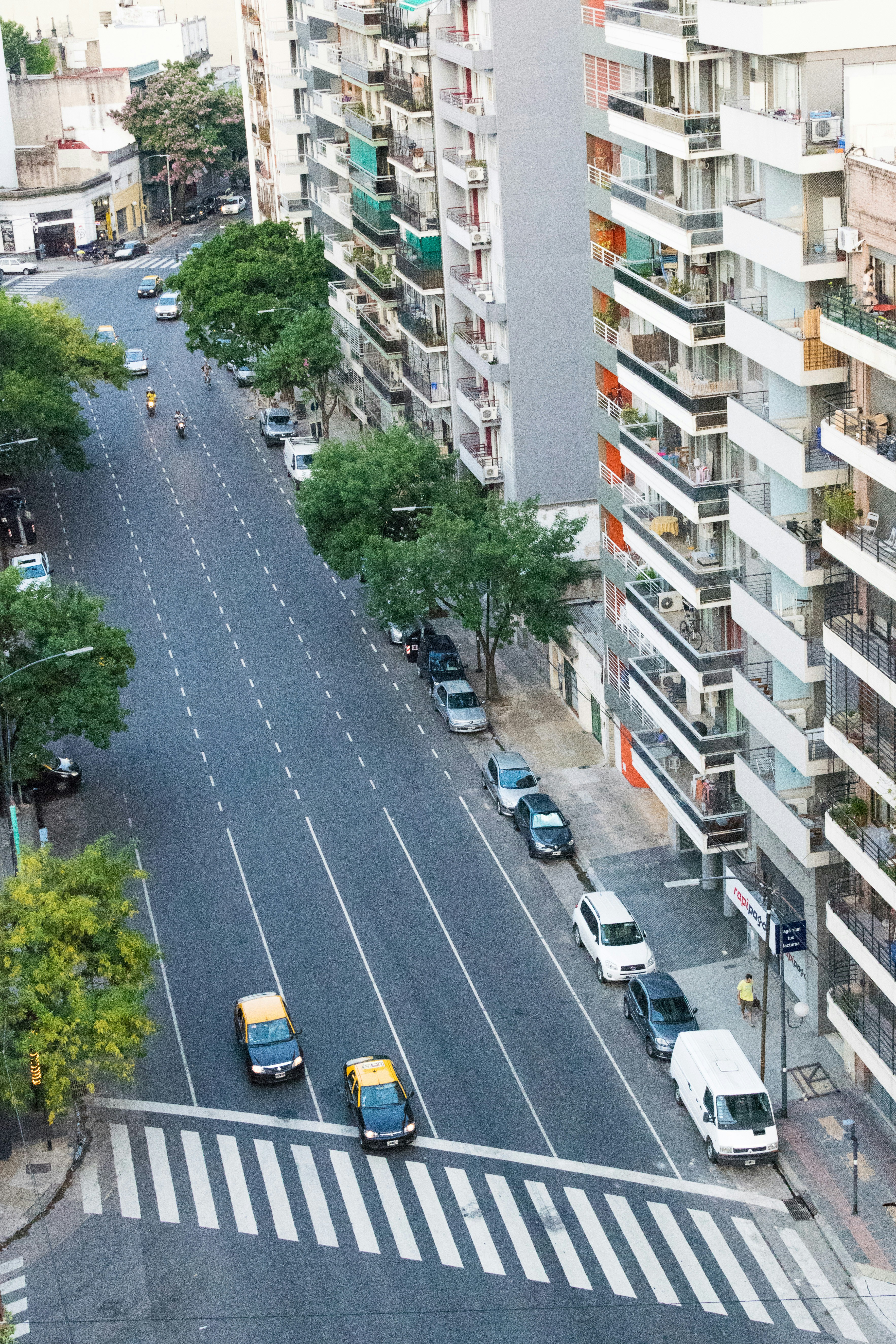 Cars on road near high rise buildings during daytime photo – Free ...