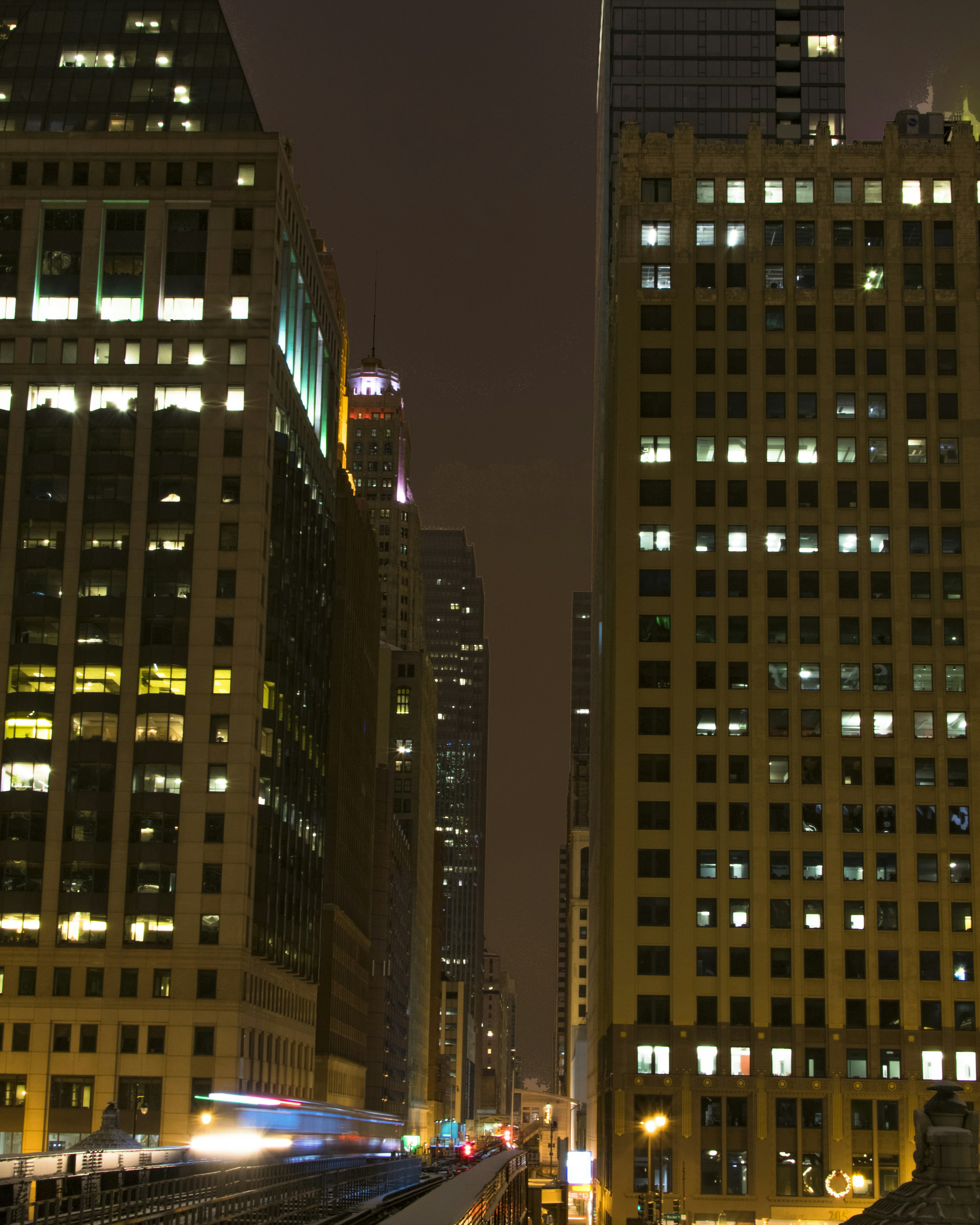 brown and black high rise building during nighttime