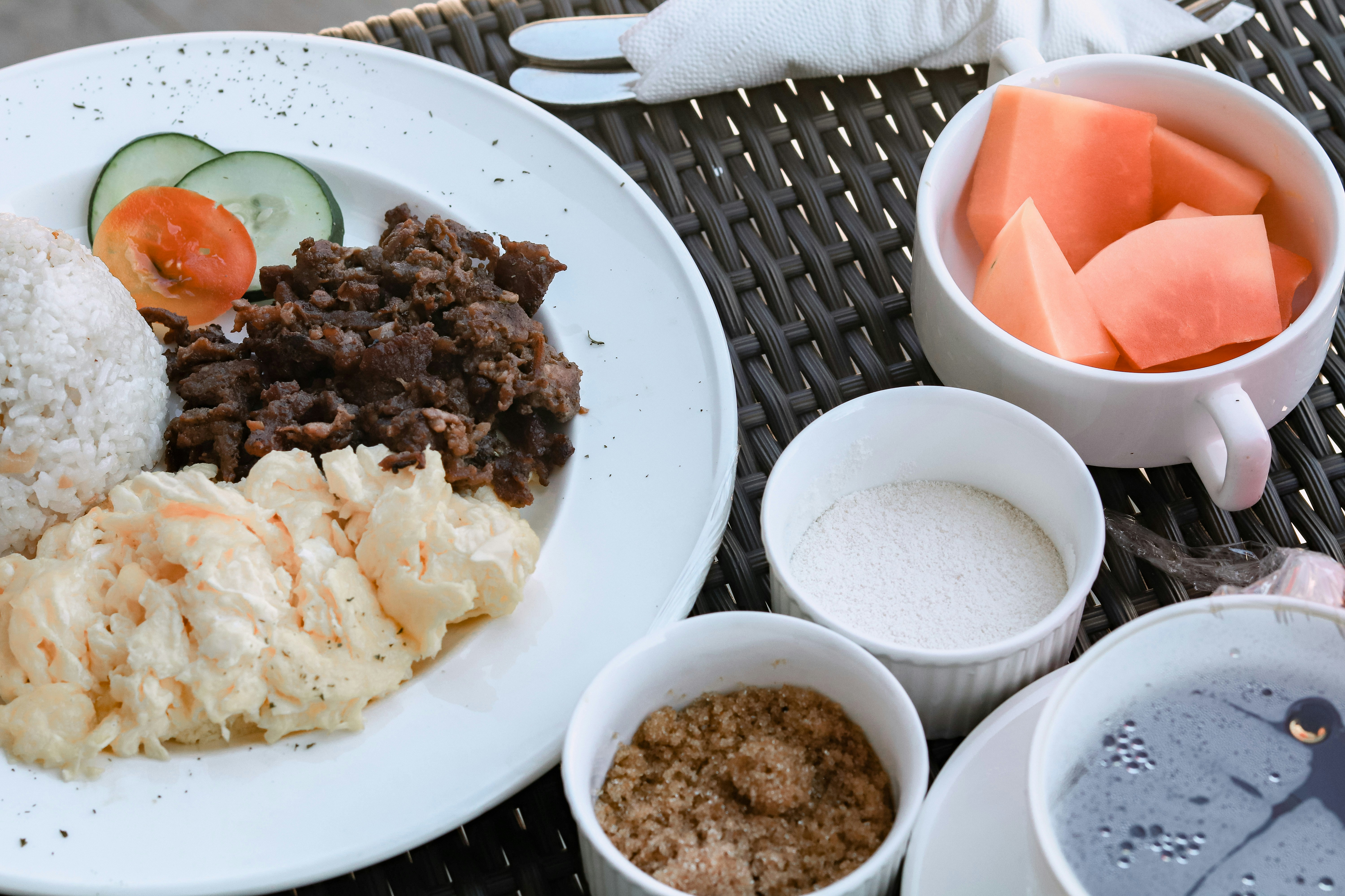 Braised Beef with Creamy Mash and Fresh Veg on a Woven Table