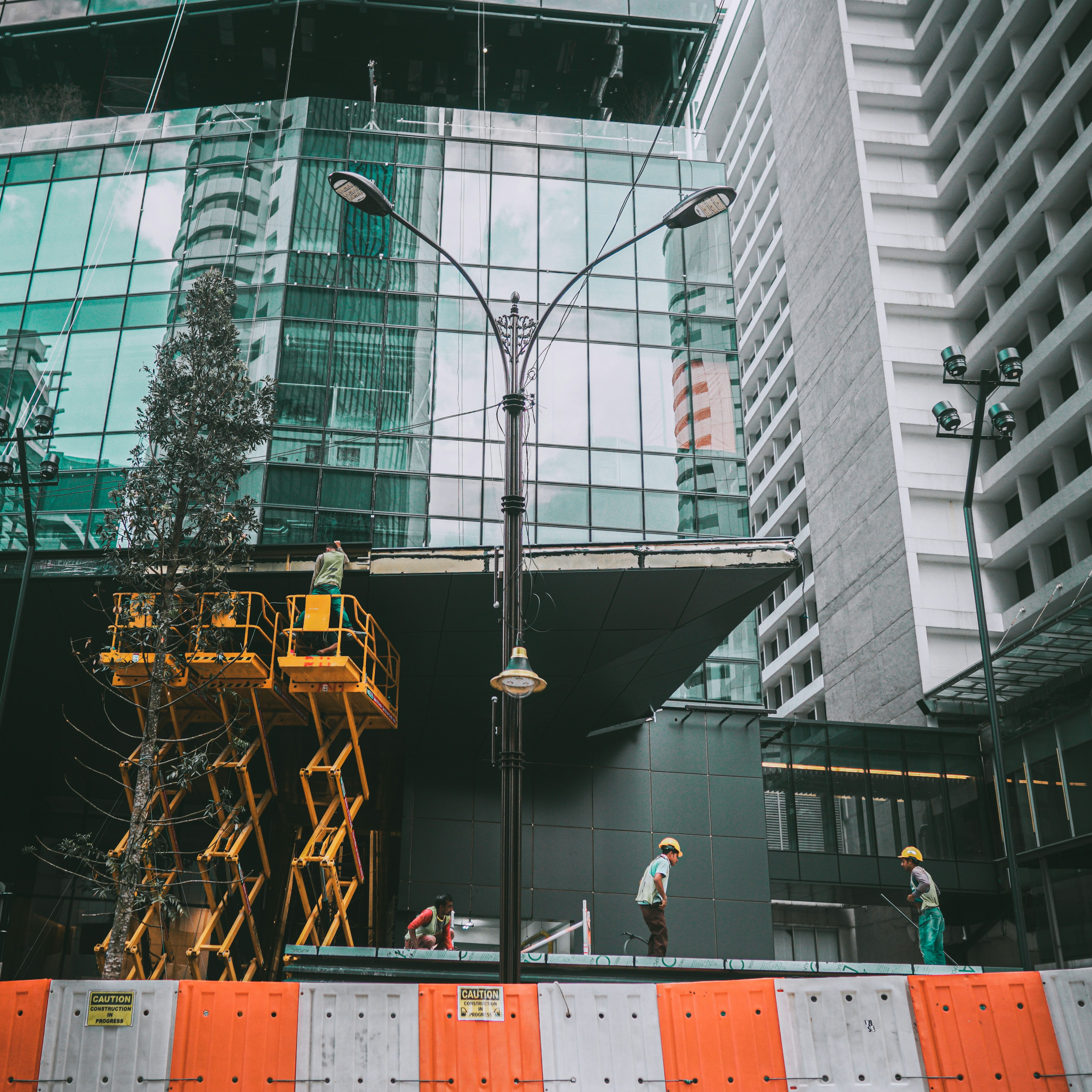 People walking on sidewalk near building during daytime photo – Free ...