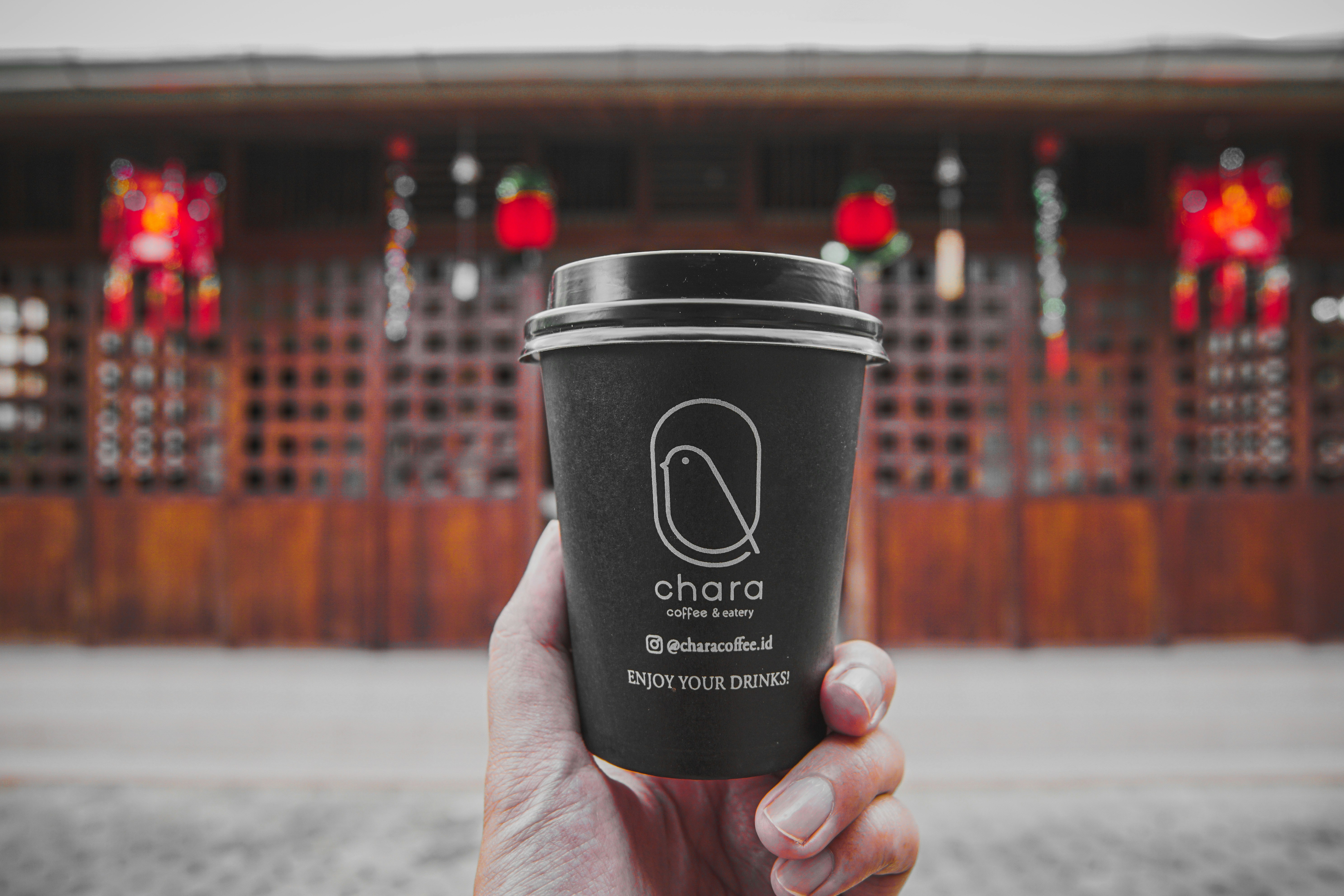 Capsule of Calm: A Handful of Coffee with a Minimalist Brand Emblem